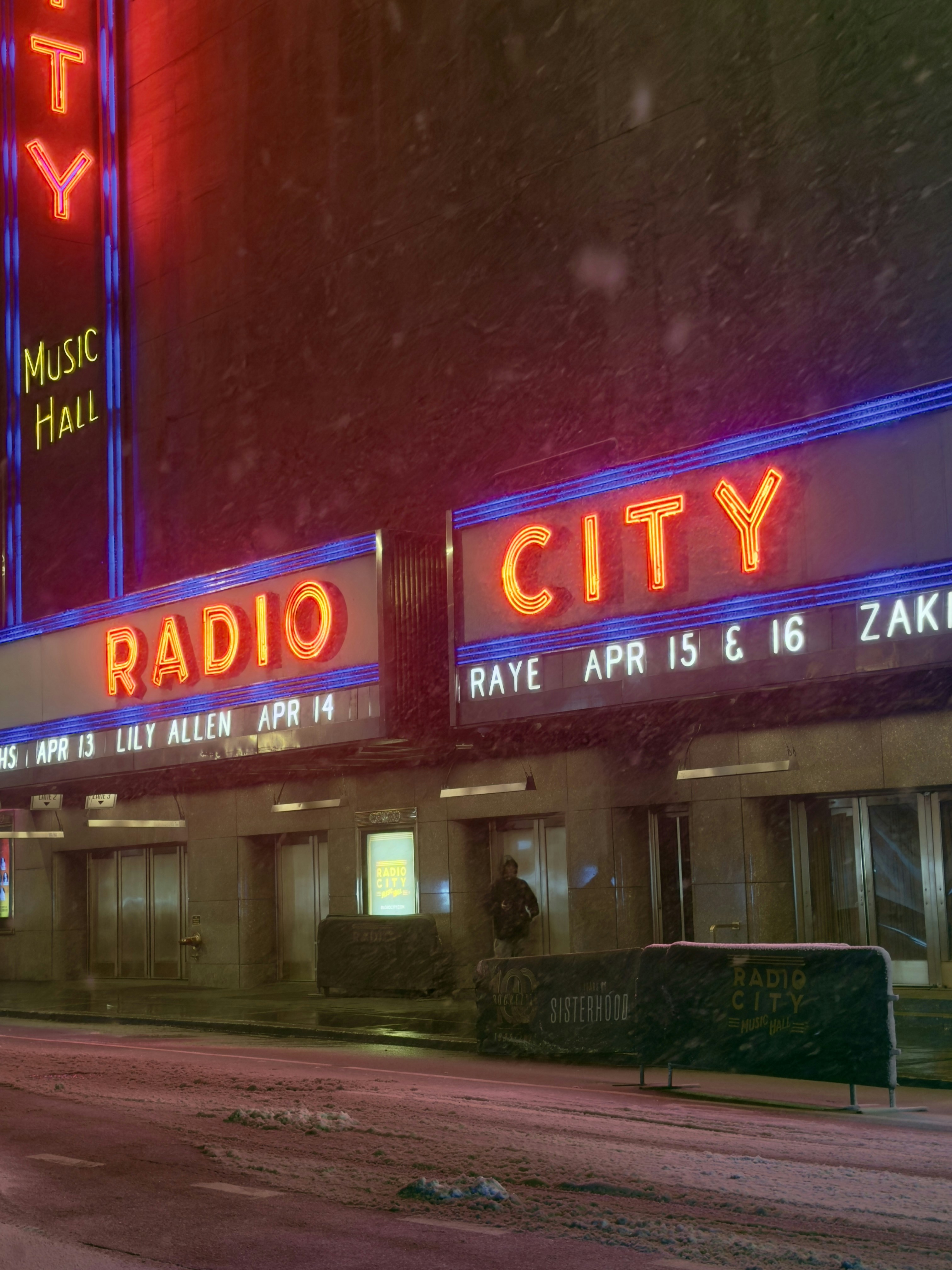 Neon Night at Radio City: Snowy Street, Red Lights