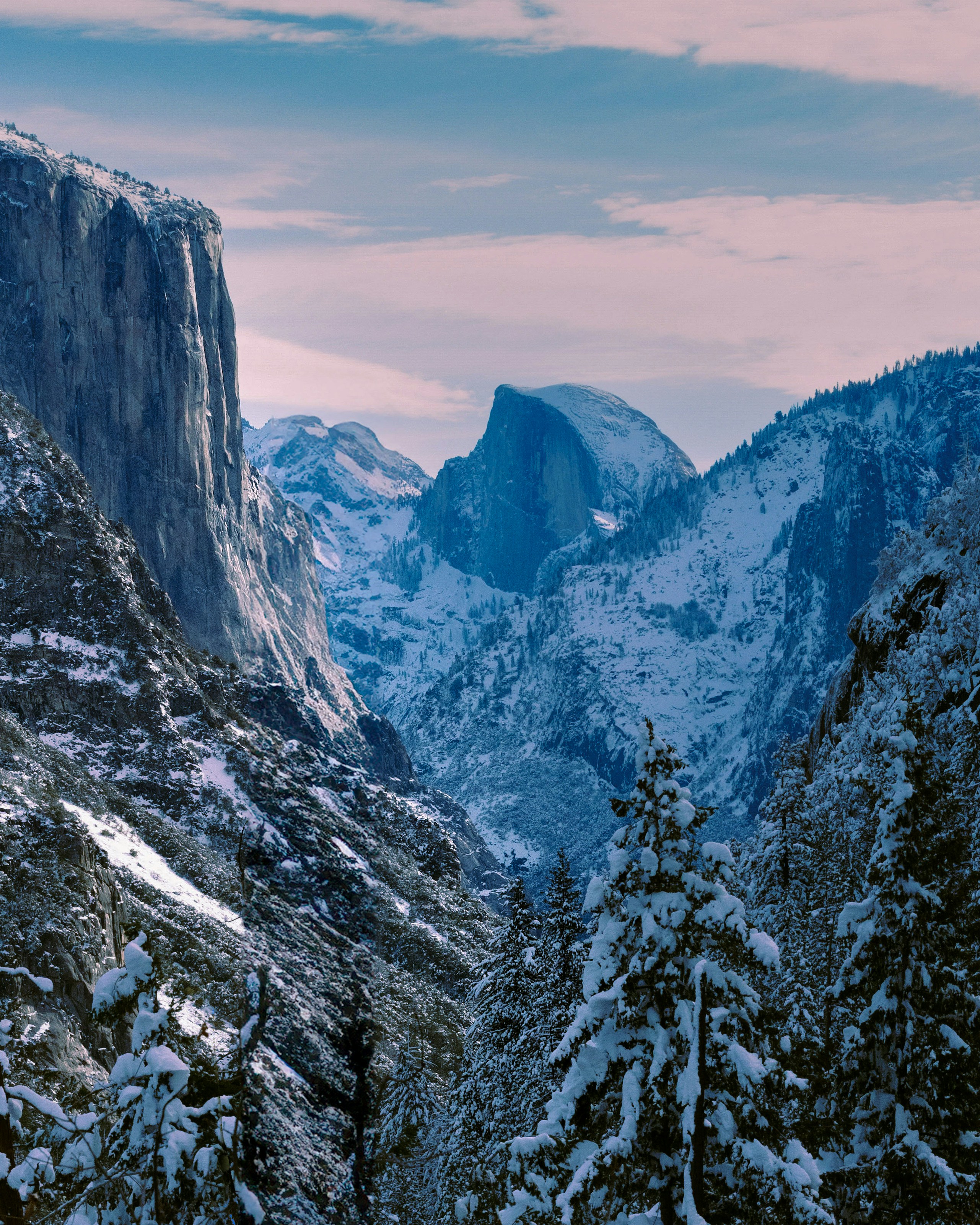 Between Snow-Capped Peaks: A Silent Valley in Blue