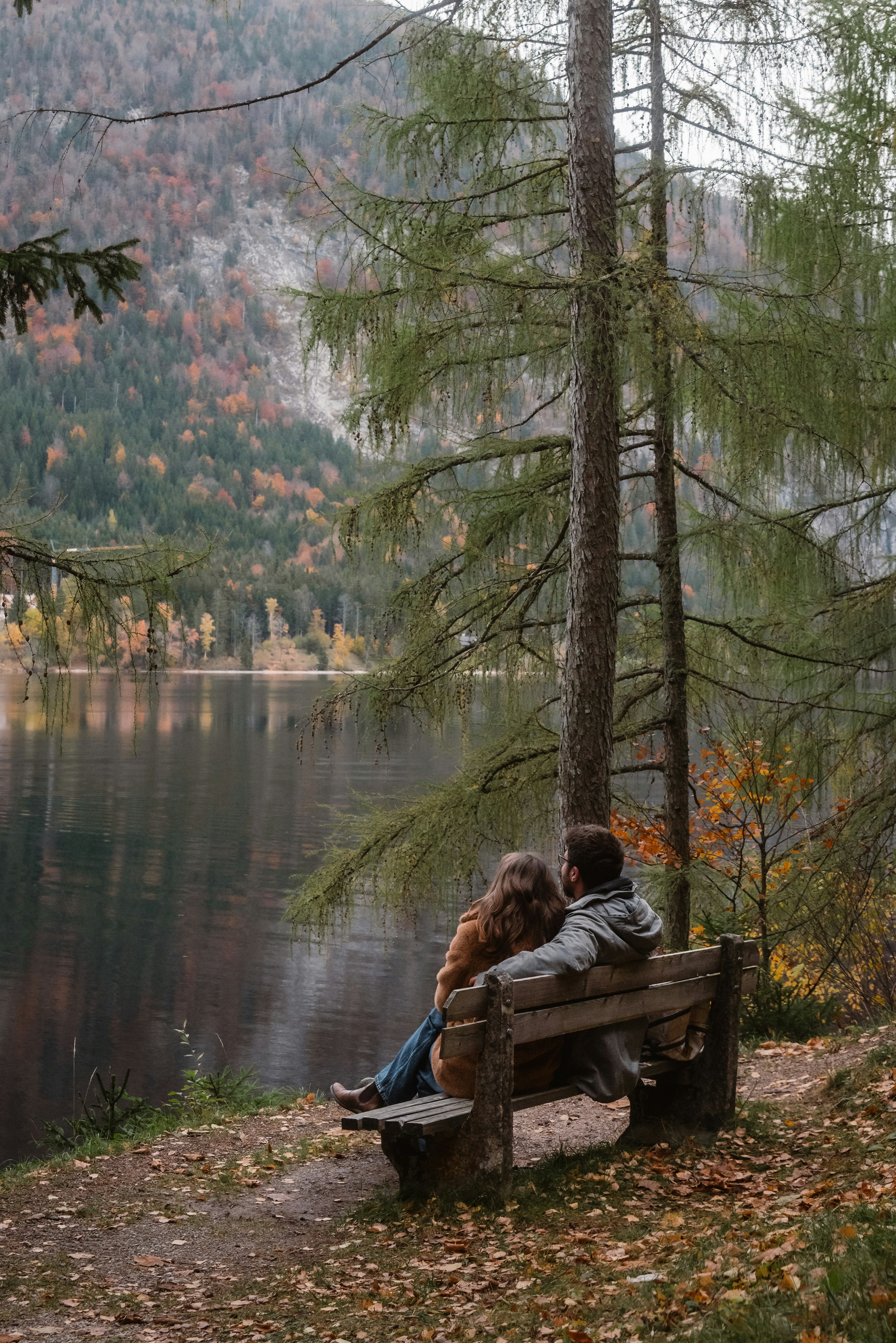 Autumn Quiet by the Lake: A Couple on the Old Bench