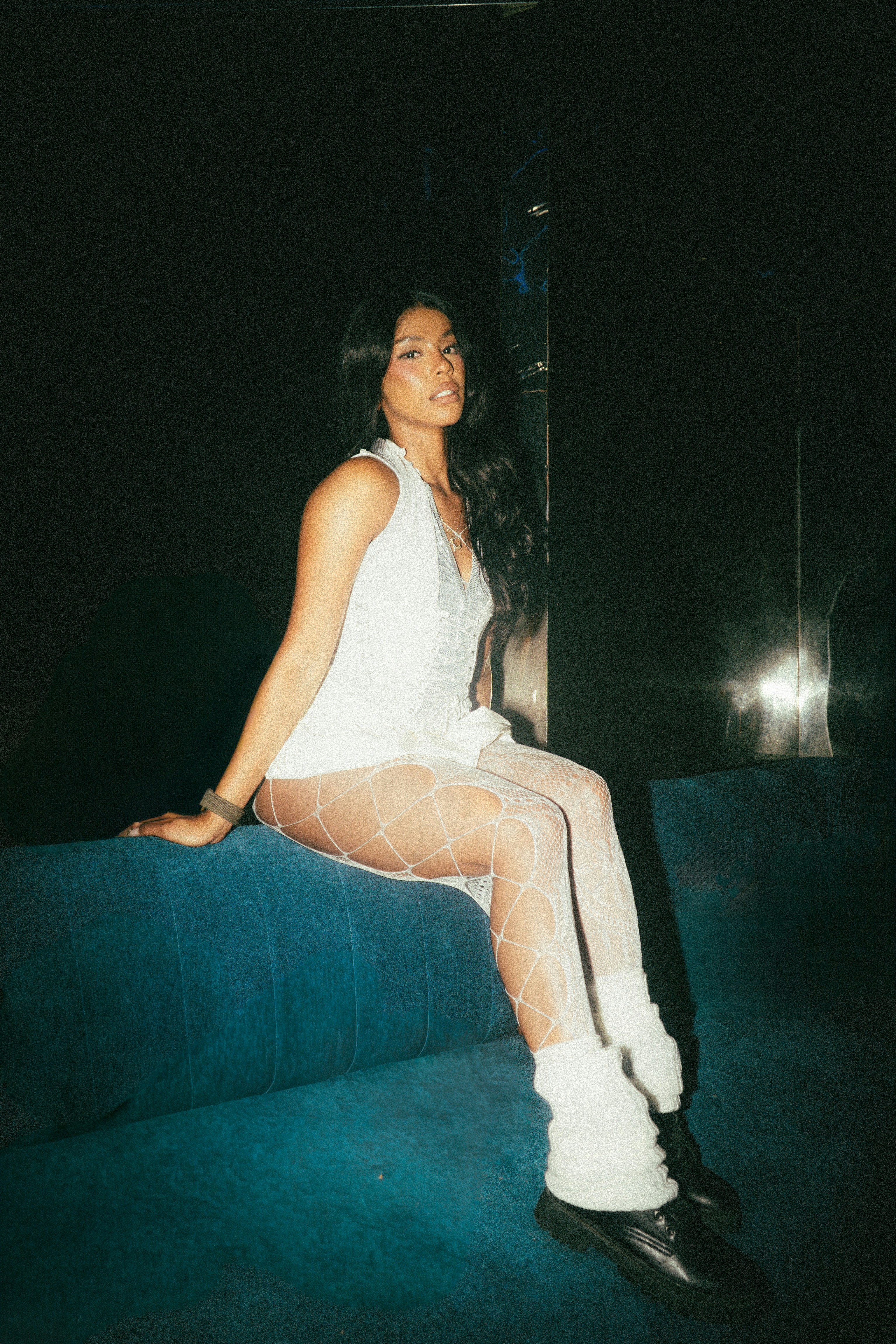 Midnight Lounge Pose: Neon Nightlight and Netted Glam