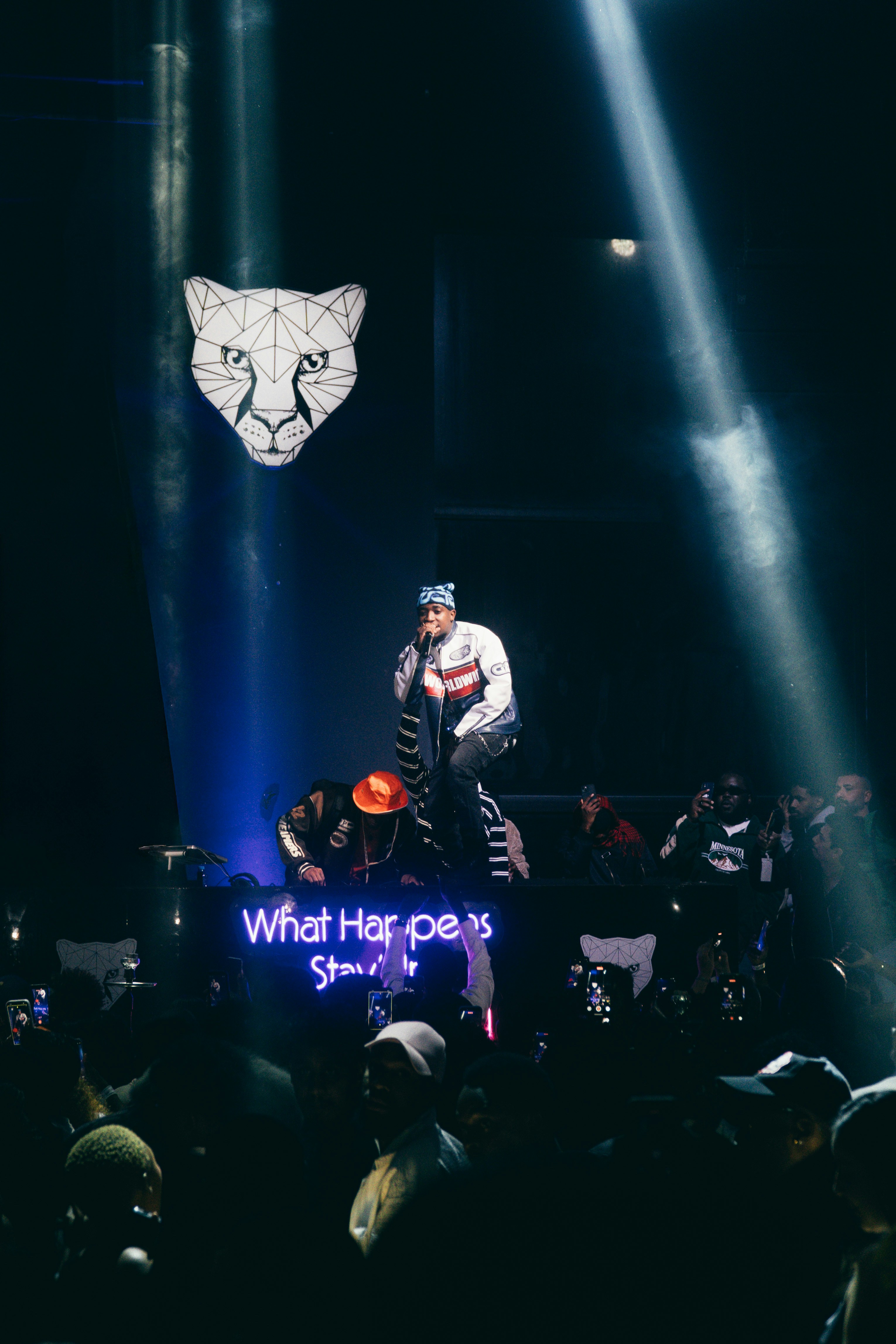 Midnight Wolf on Stage: Neon Pulse and Geometric Light
