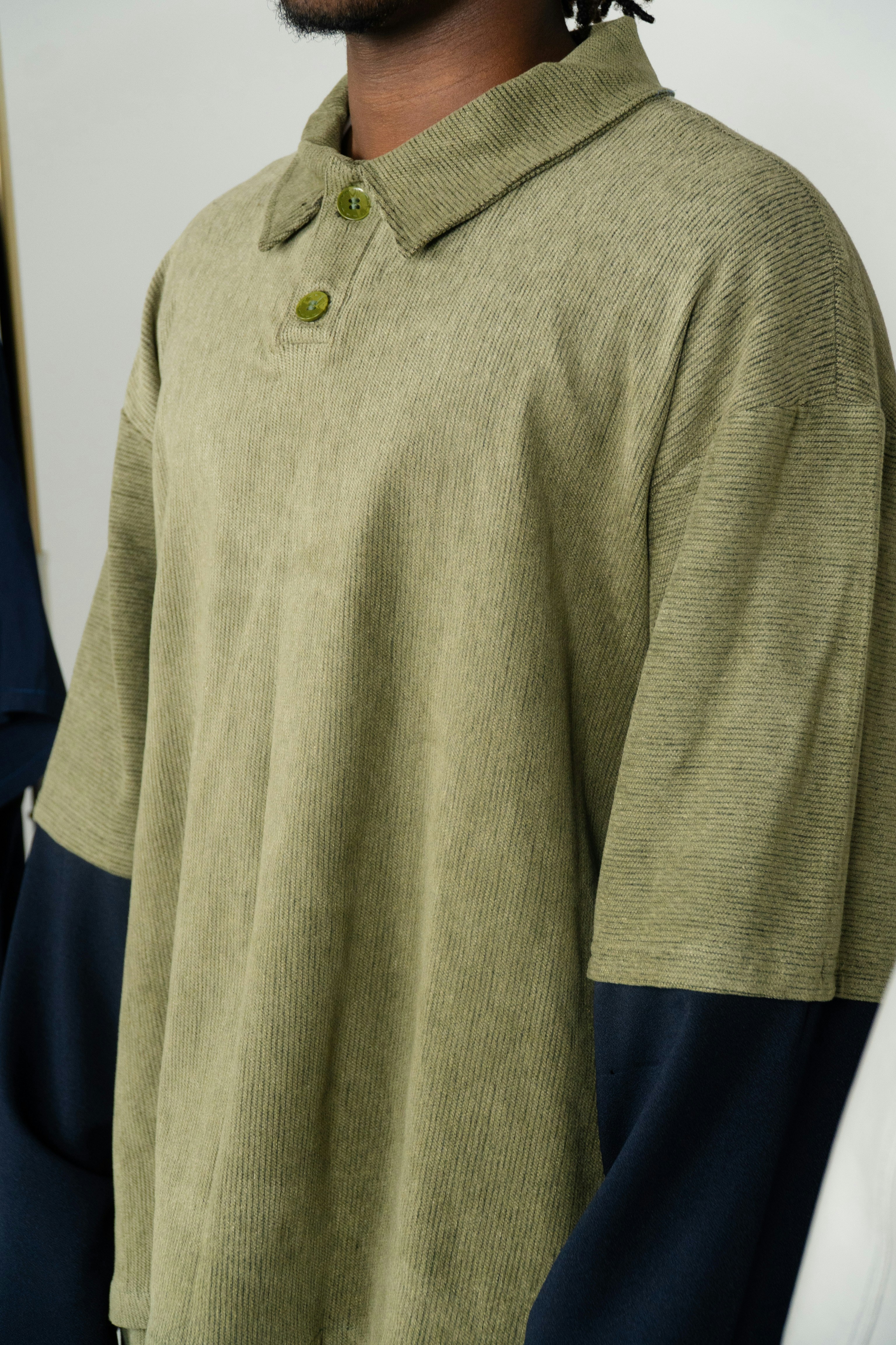 Close-Cropped Portrait of a Beige Polo Shirt on a Man