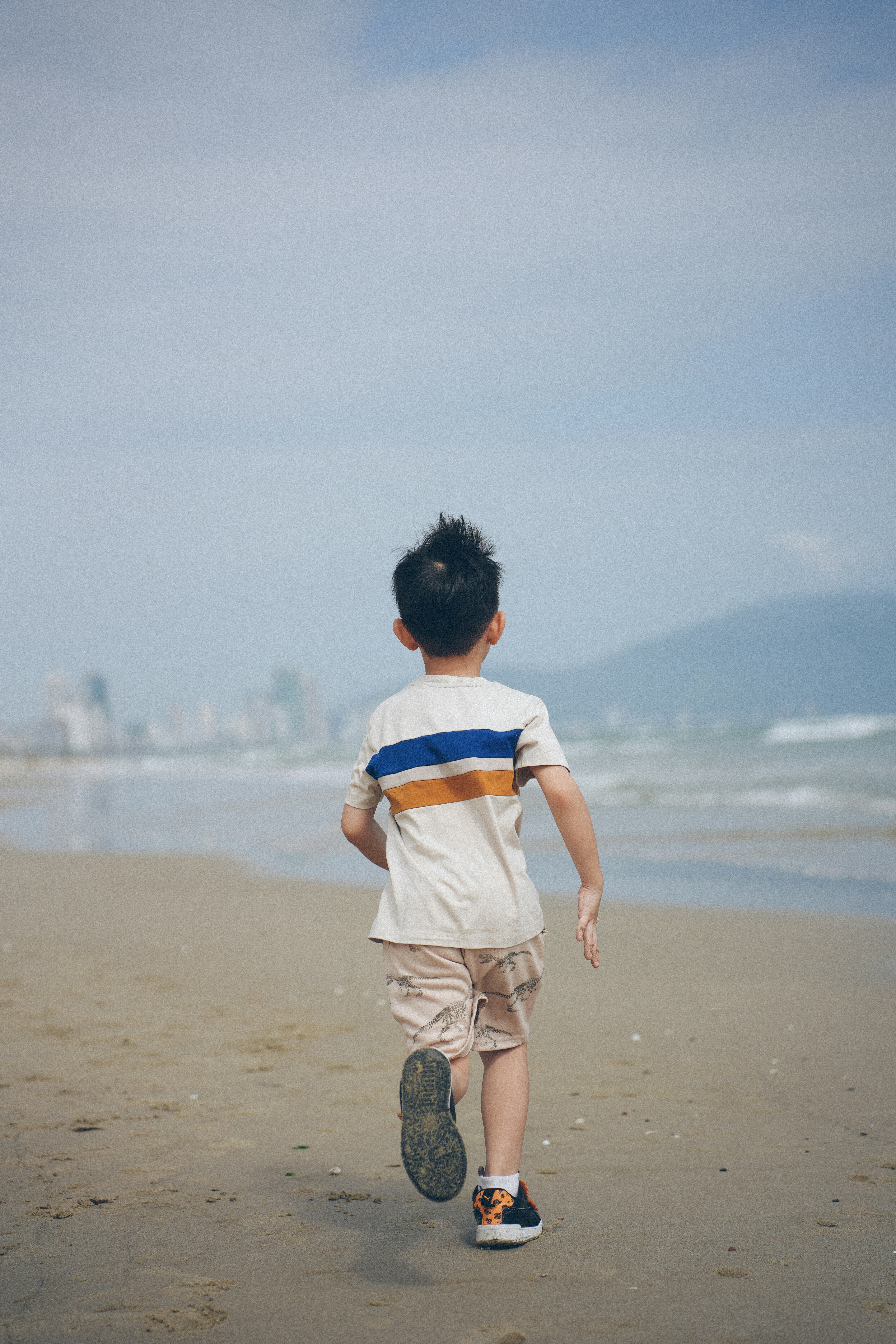 Child in Motion along a Quiet Coastal Path