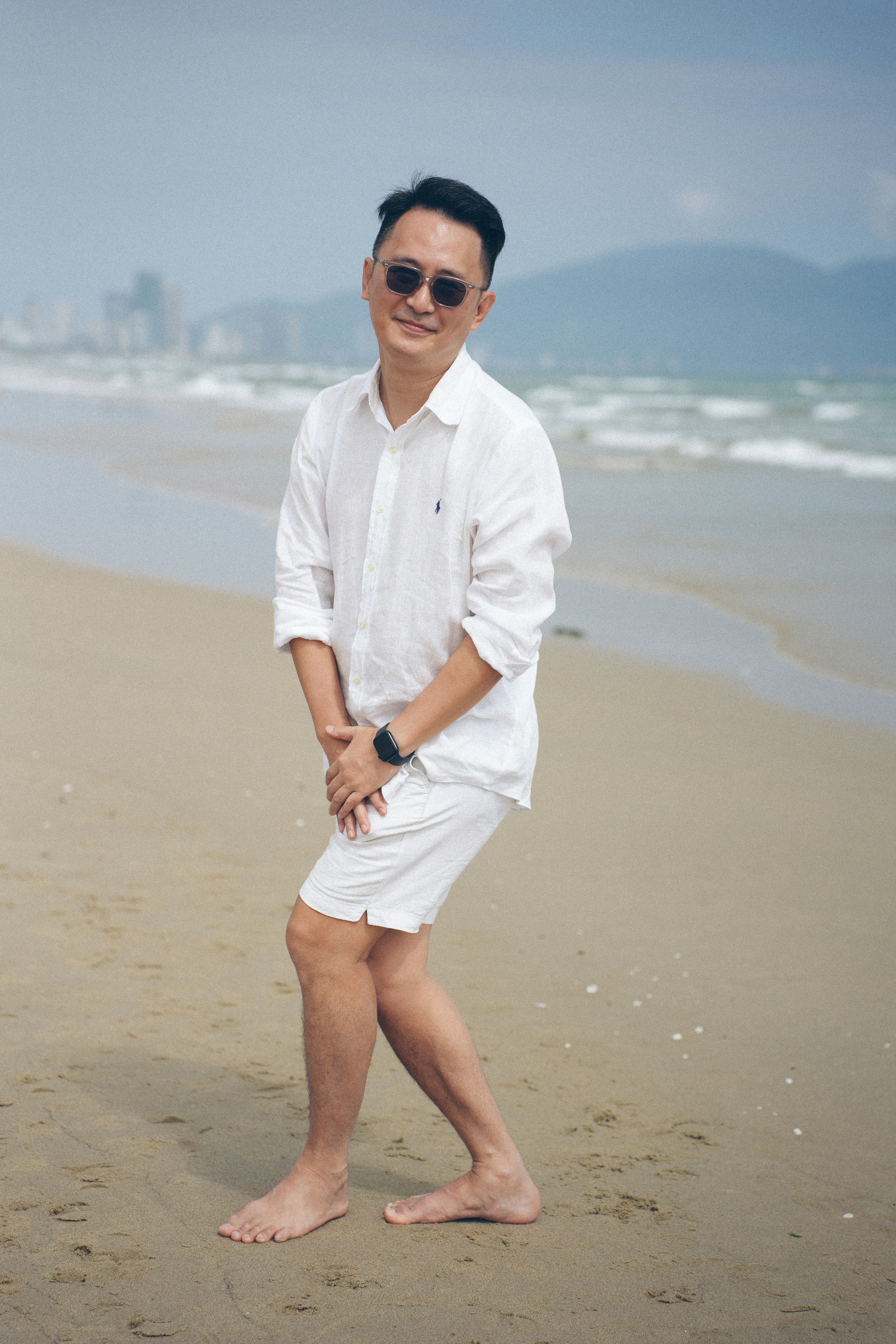 White Shores, Quiet Smile: A Beach Portrait in Calm daylight