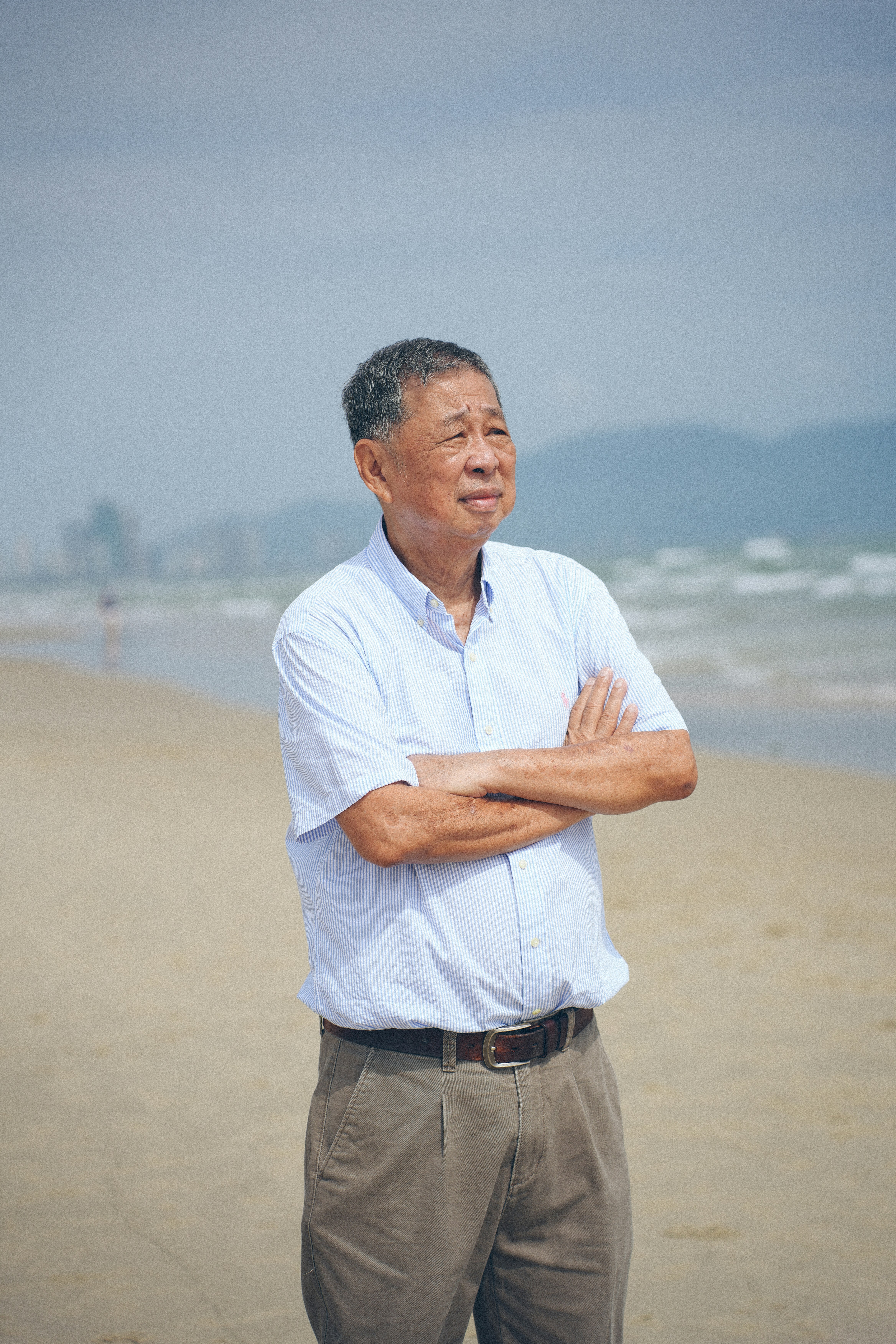 Cross-armed Confidence on the Quiet Shore