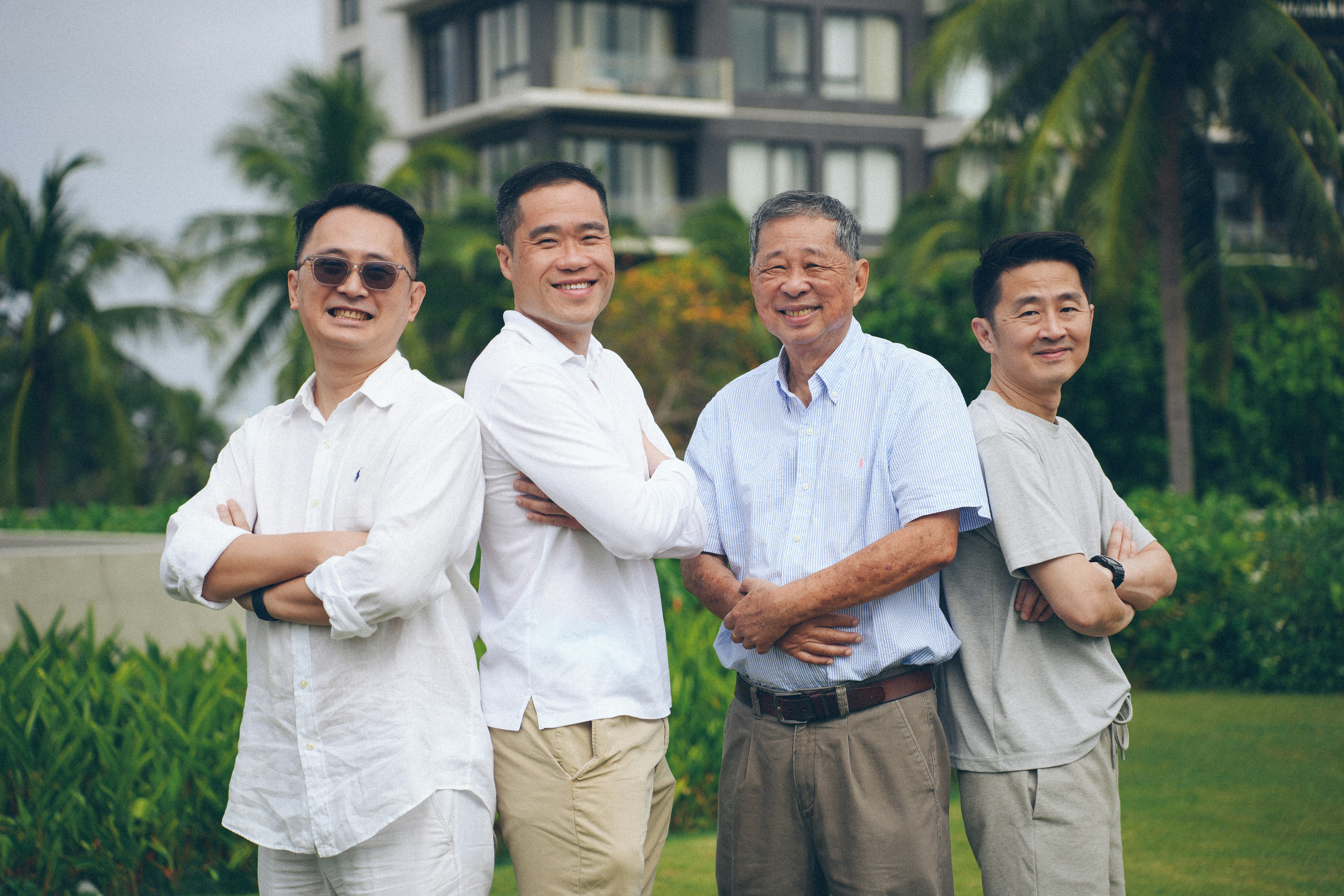 Four Generations, One Moment: A Sunlit Portrait in a Lush Garden