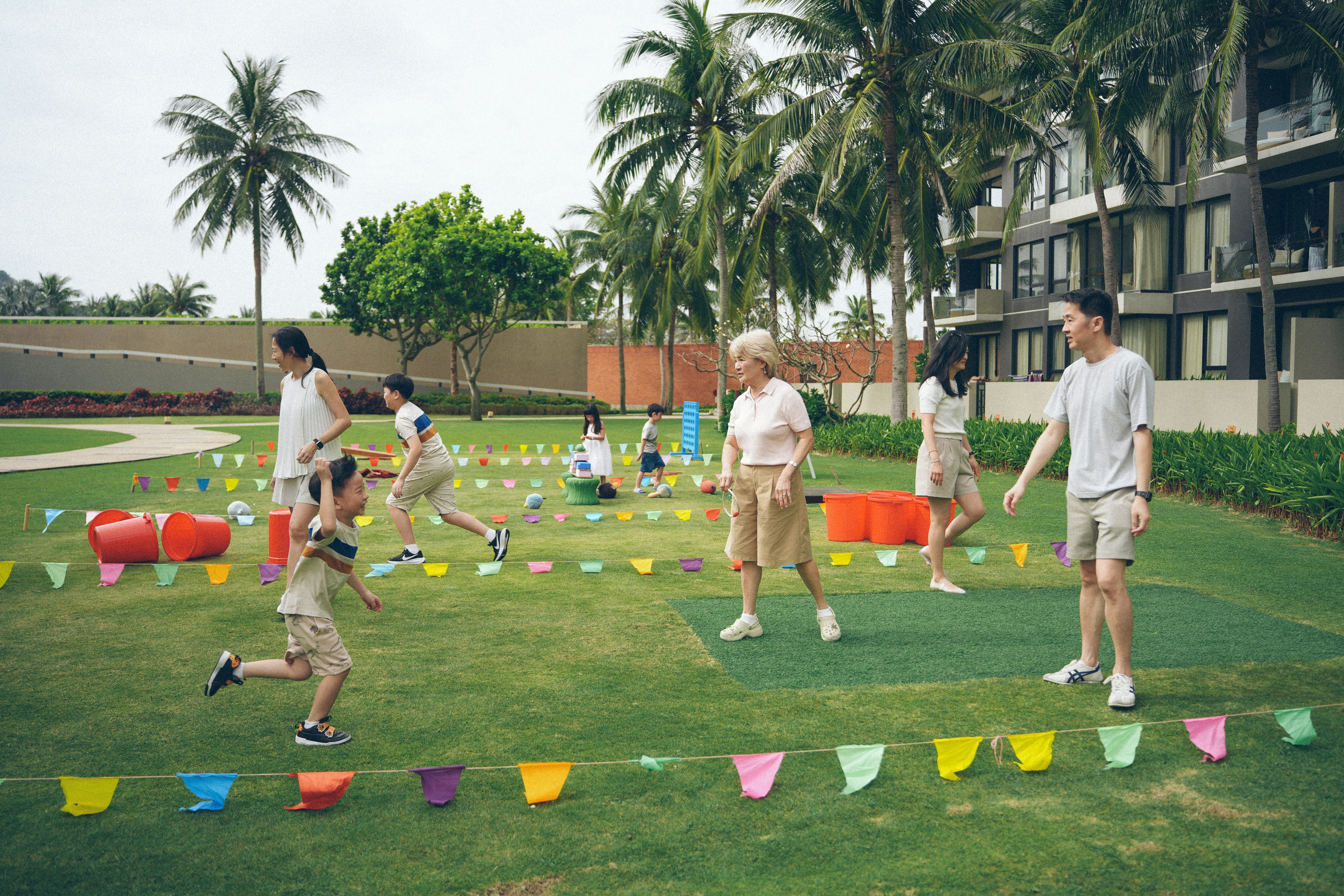 Colorful Field of Play: Family and Friends in a Flag-Bannered Course