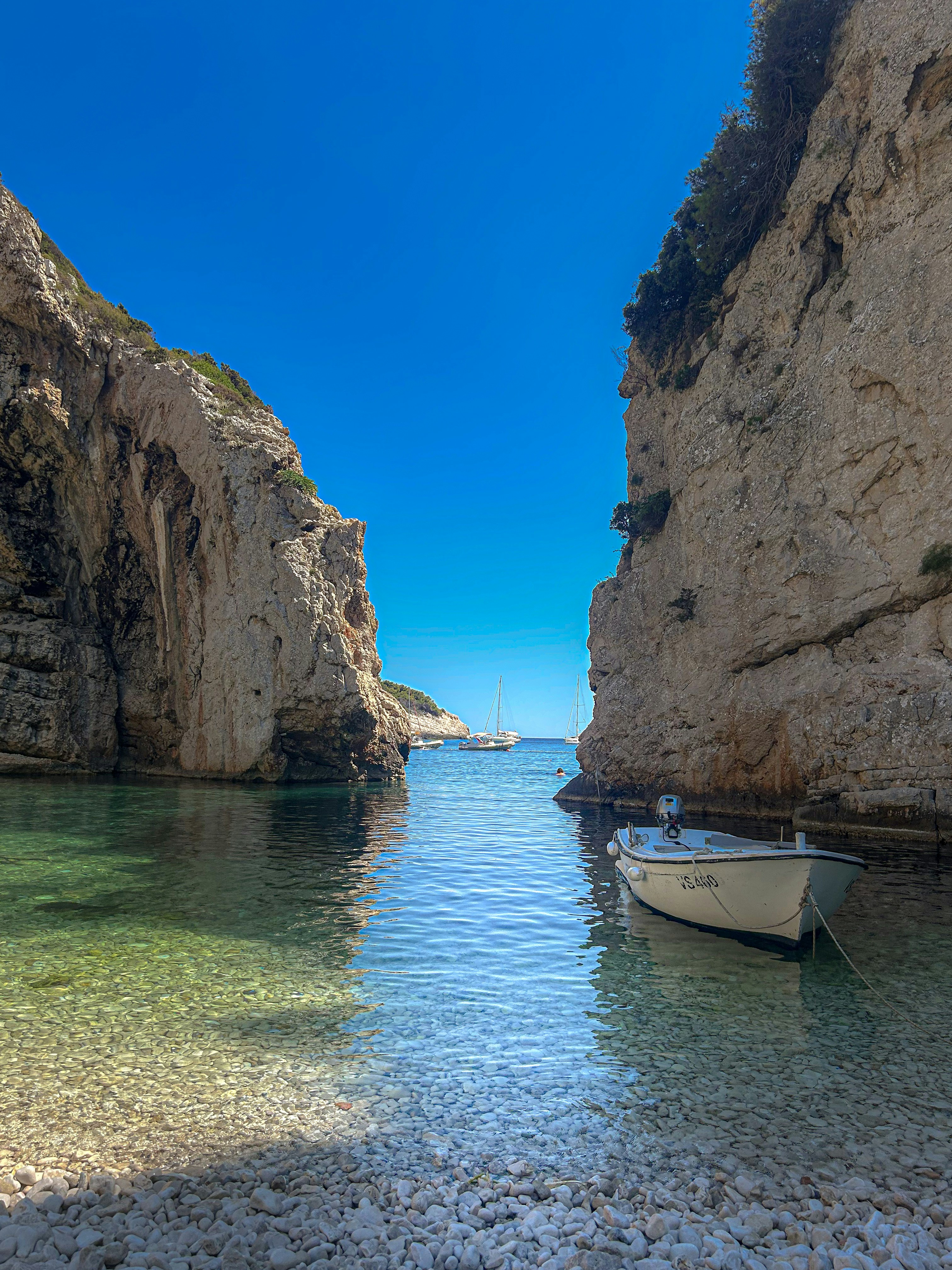 Cove Between Sail-silvered Cliffs