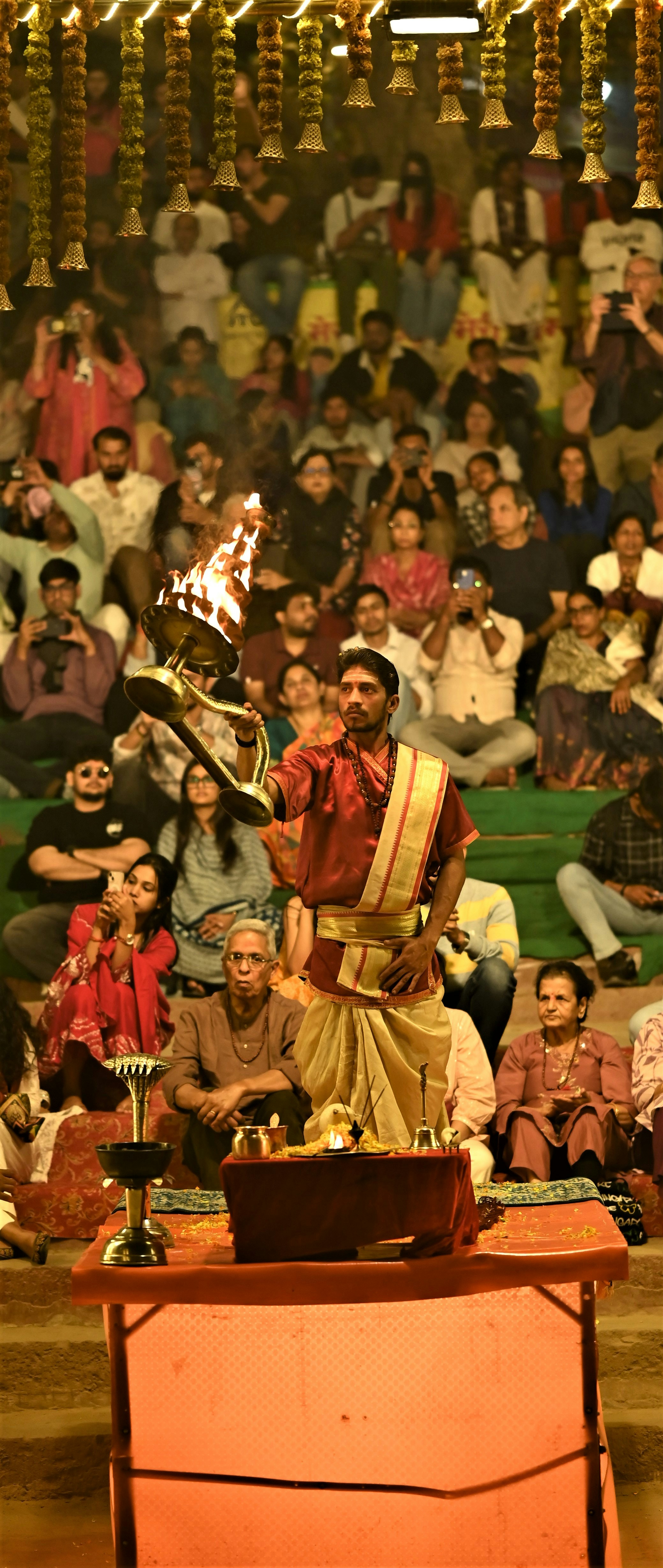 Sacred Flame: A Solo Aarti Amidst a Live Festival Crowd