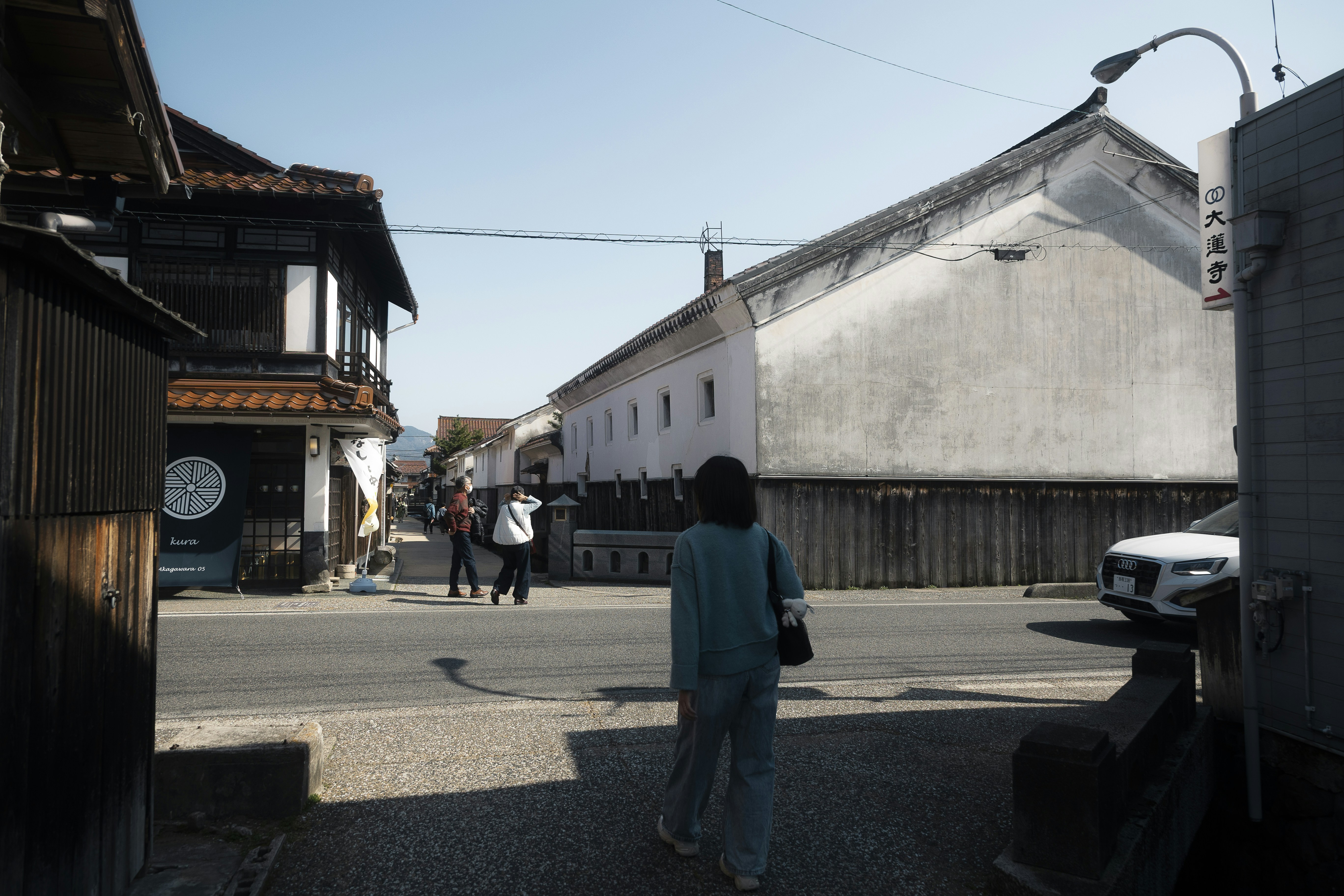 Quiet Street Dawn: A Painterly Scene of a Pedestrian Pause