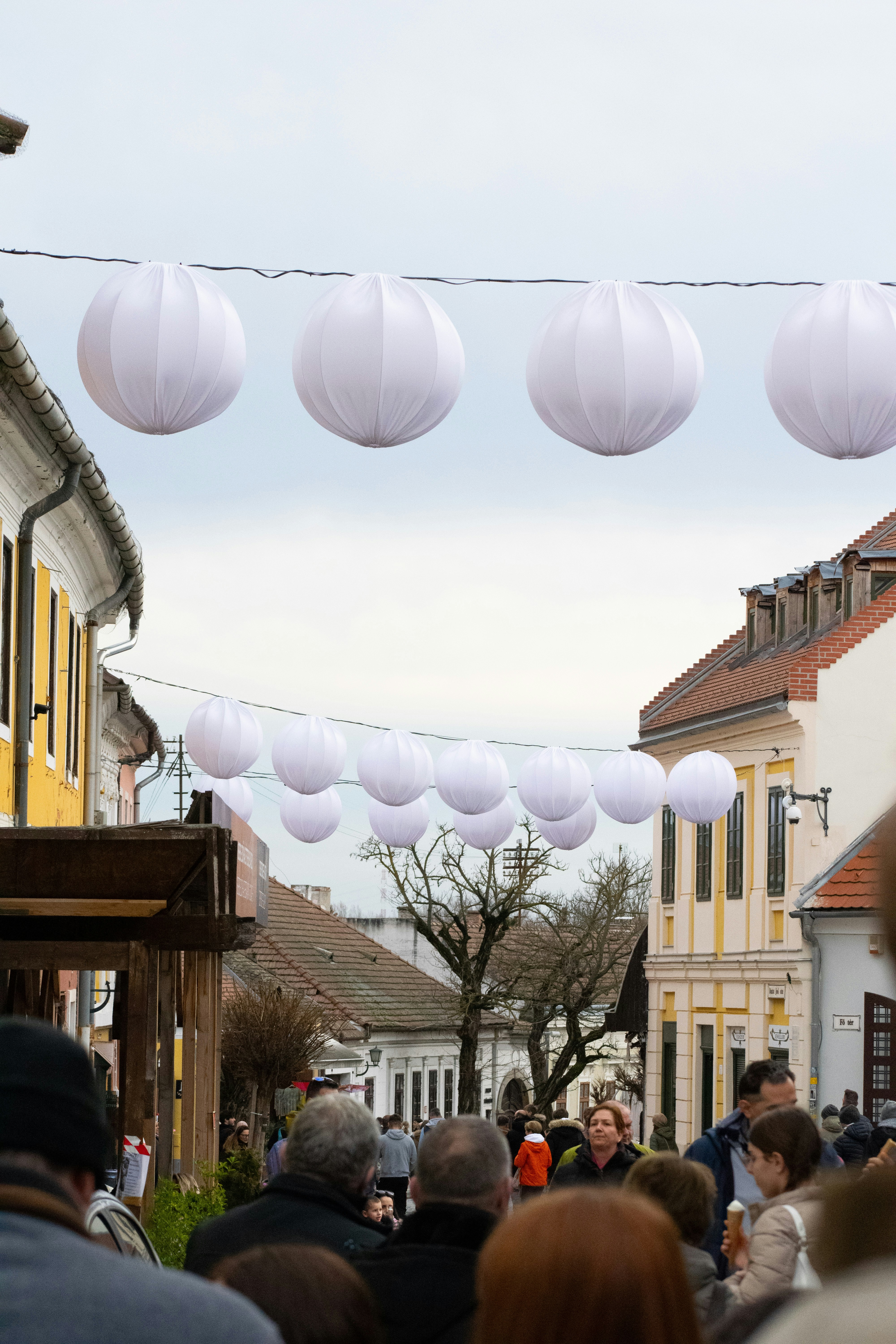 Lanterns Over a Bustling Street Festival