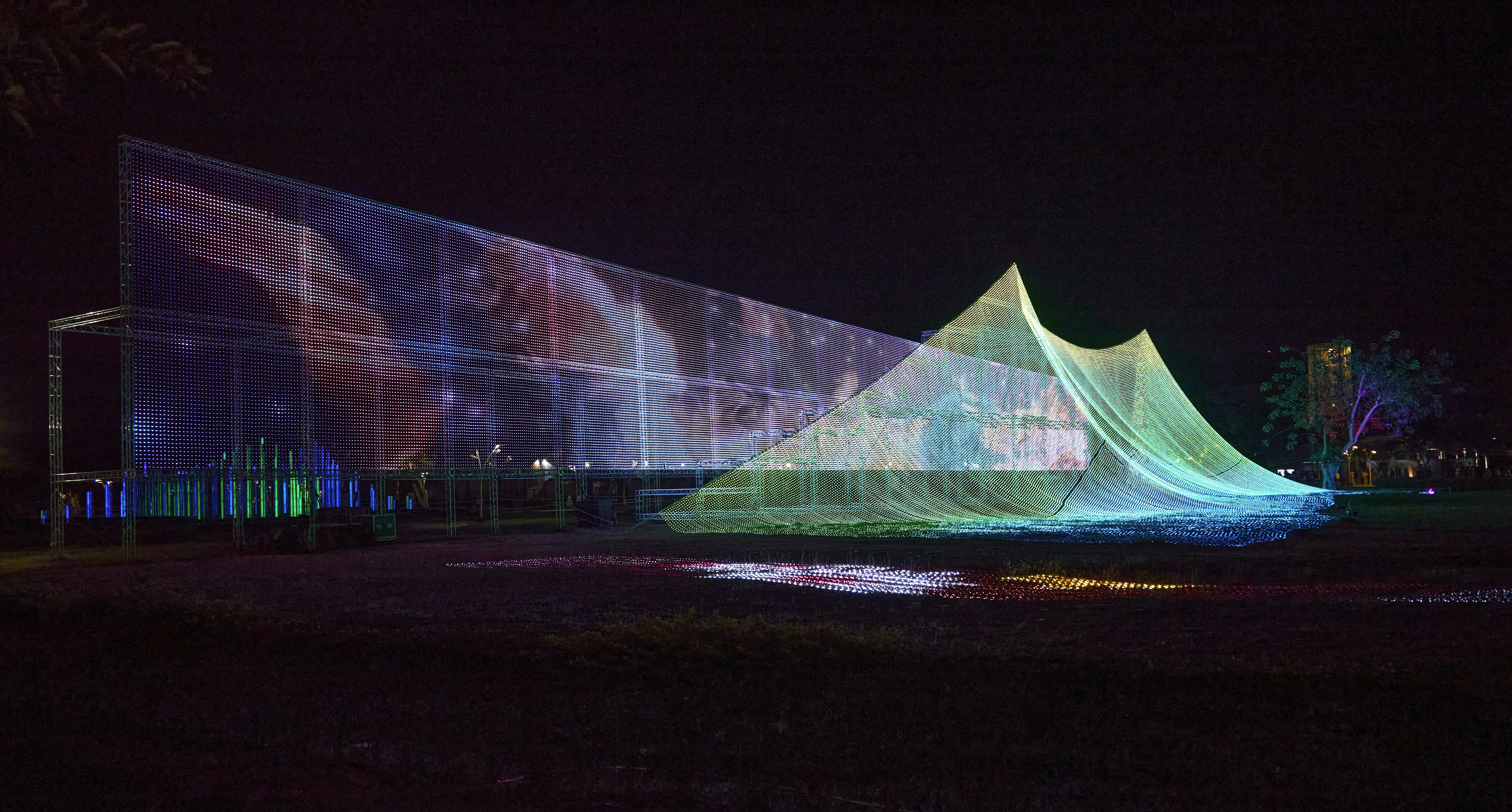 Spectral Tentacle: A Night Performance of Light and Fabric