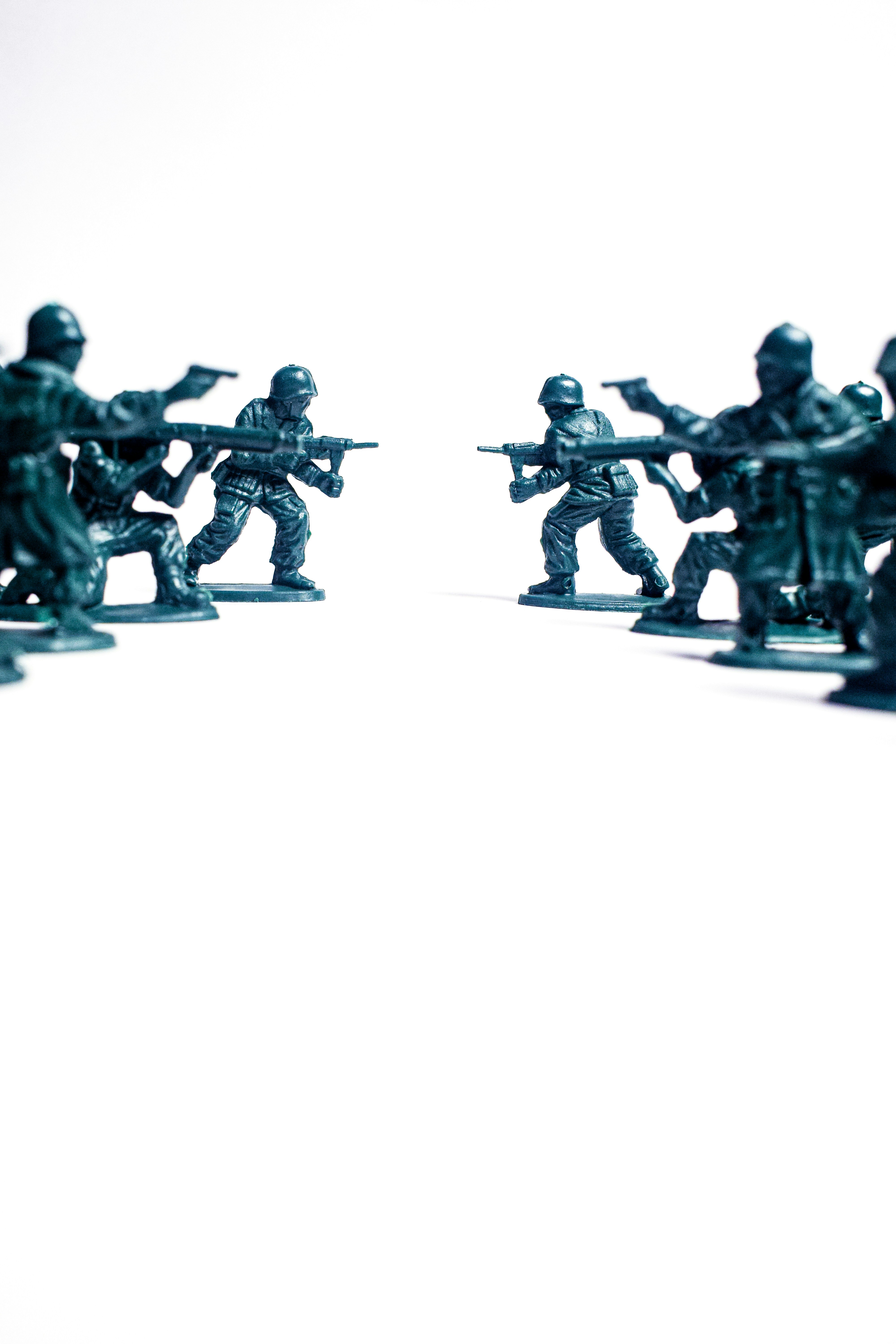 Blue-tinted soldiers advancing in shallow perspective