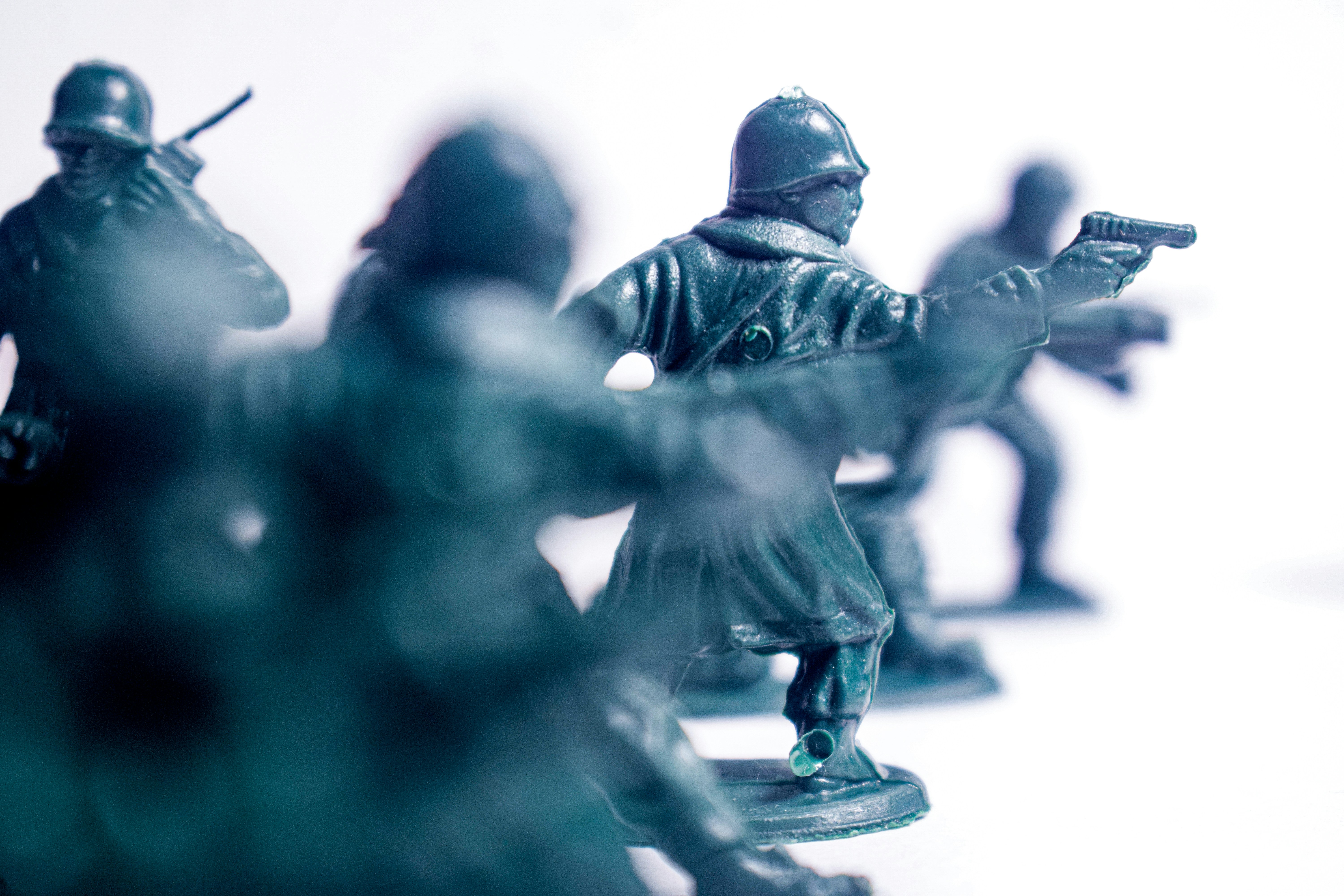 Marching Shadows: Toy Soldiers in a Narrow Corridor