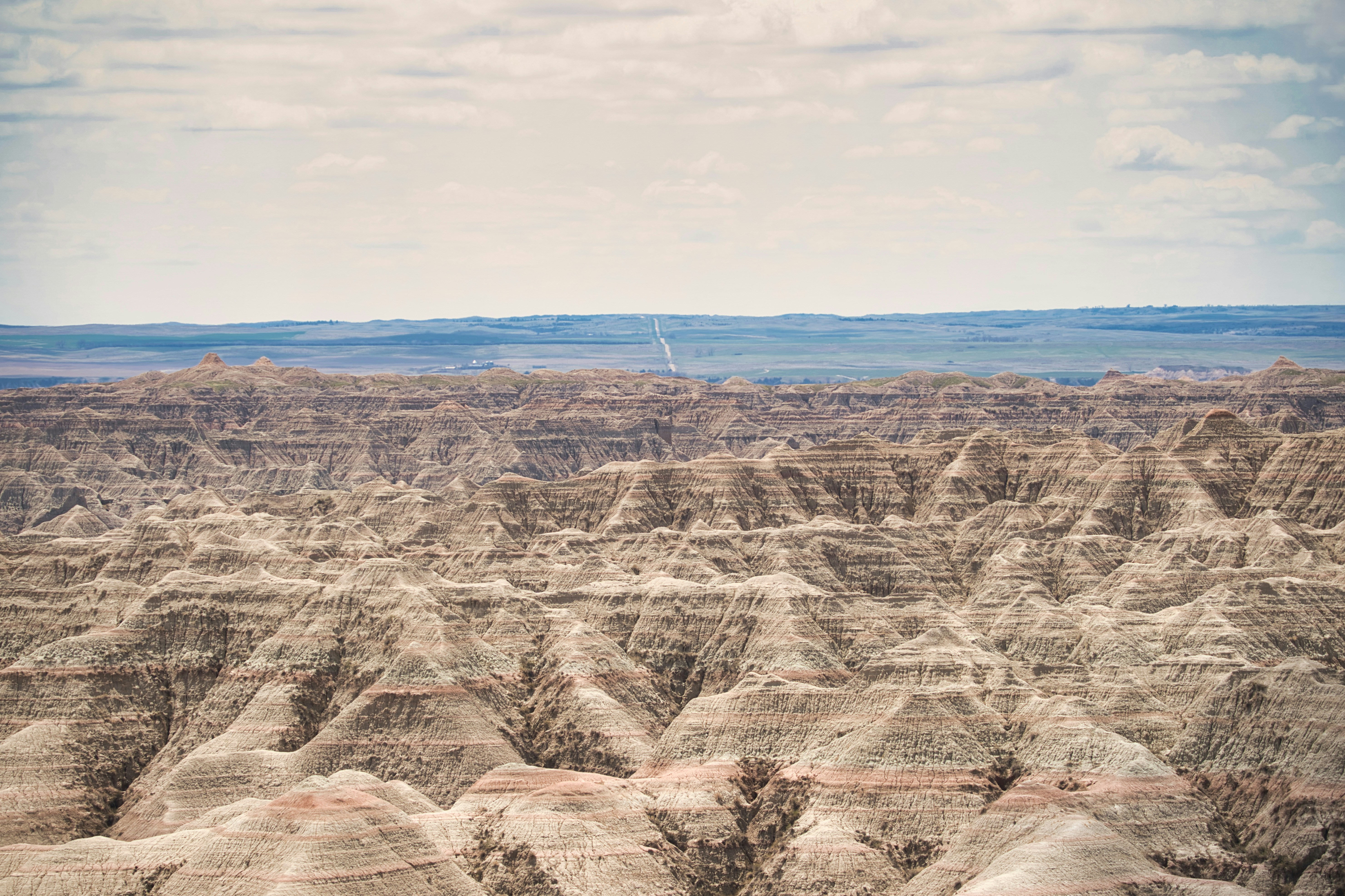 Echoes of the Earth’s Labyrinth: Layered Cliffs Across the Horizon
