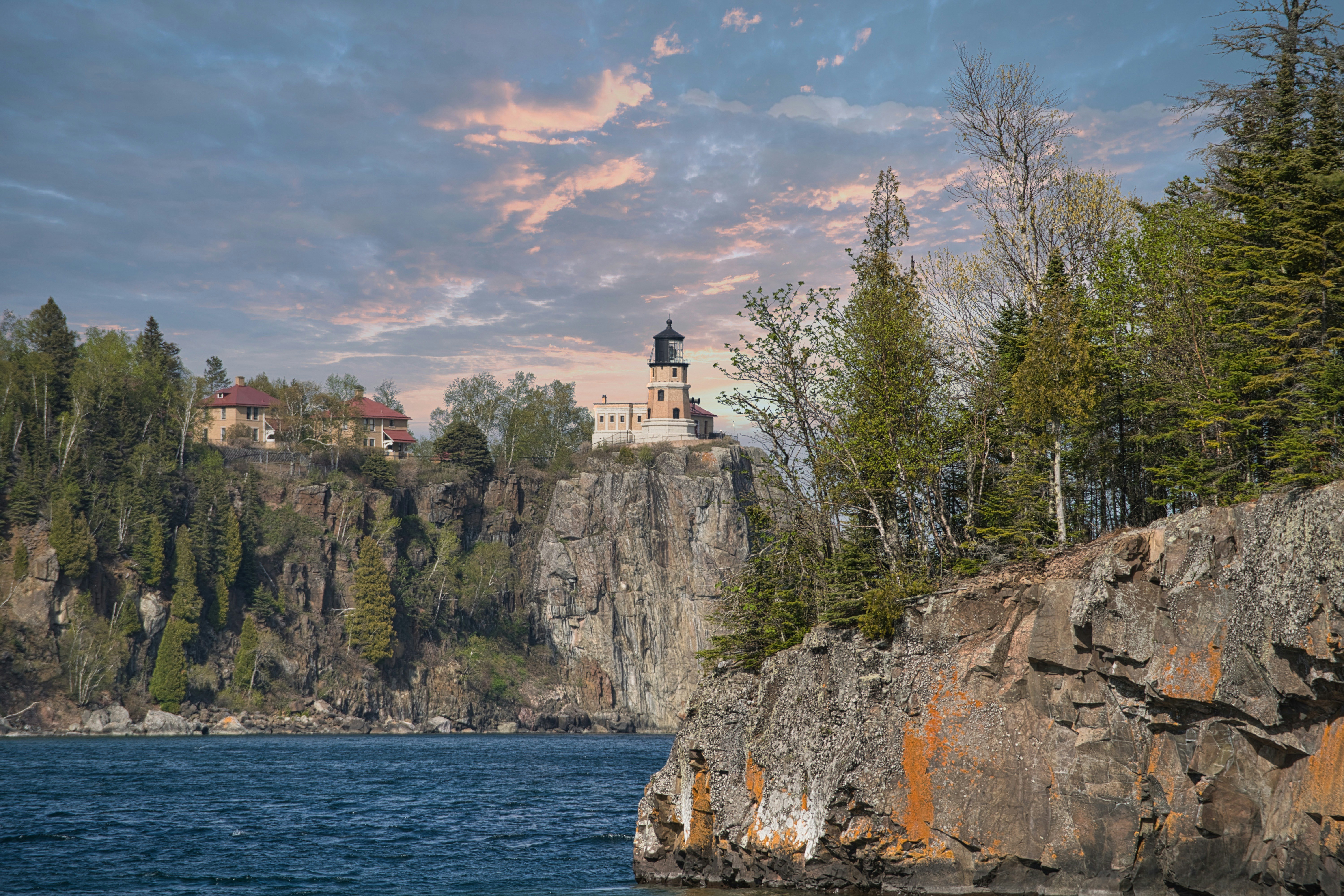 Lighthouse Crest: A Cliffside Beacon over Quiet Waters