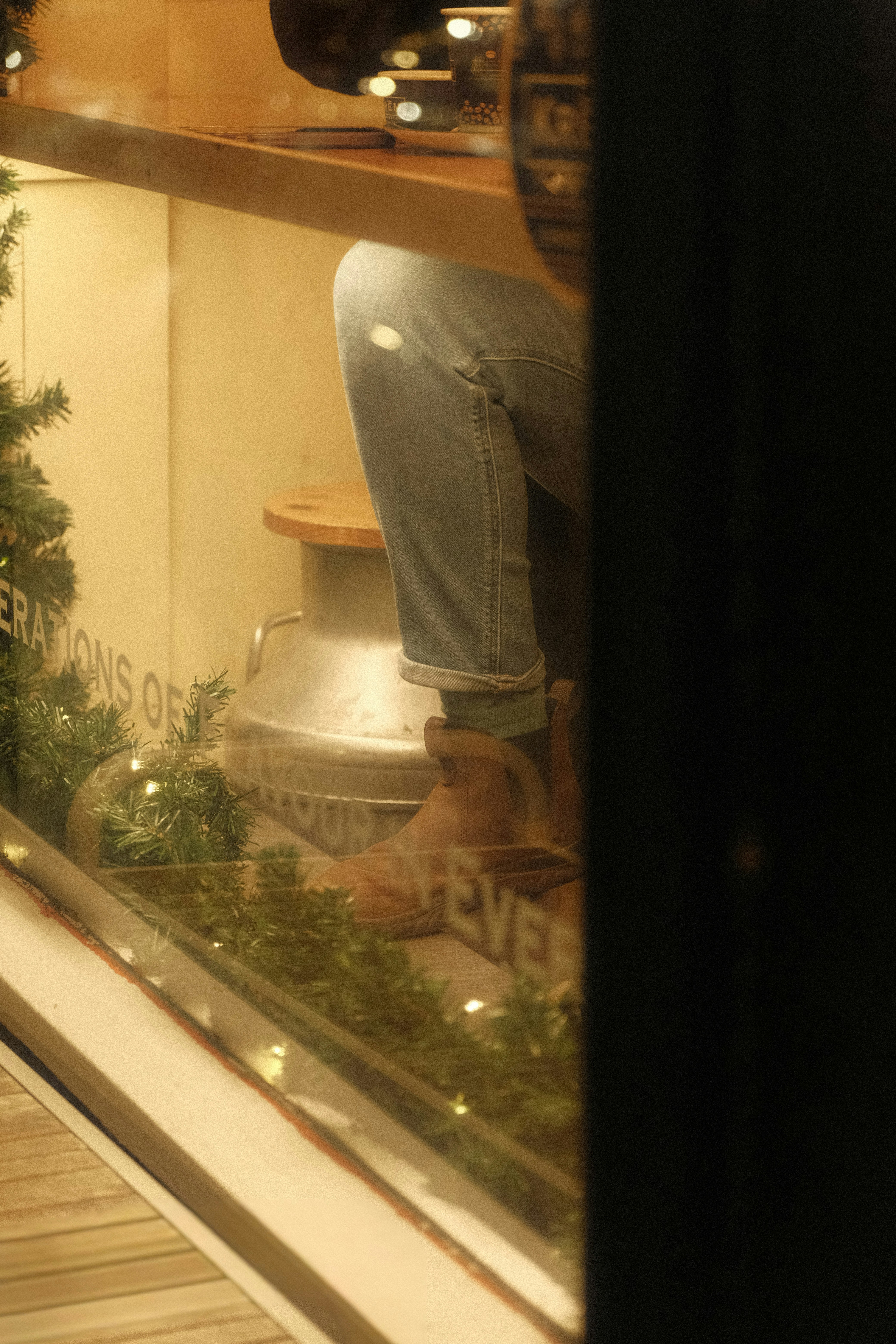 Hidden Footwear and Jeans in a Window Shop Moment