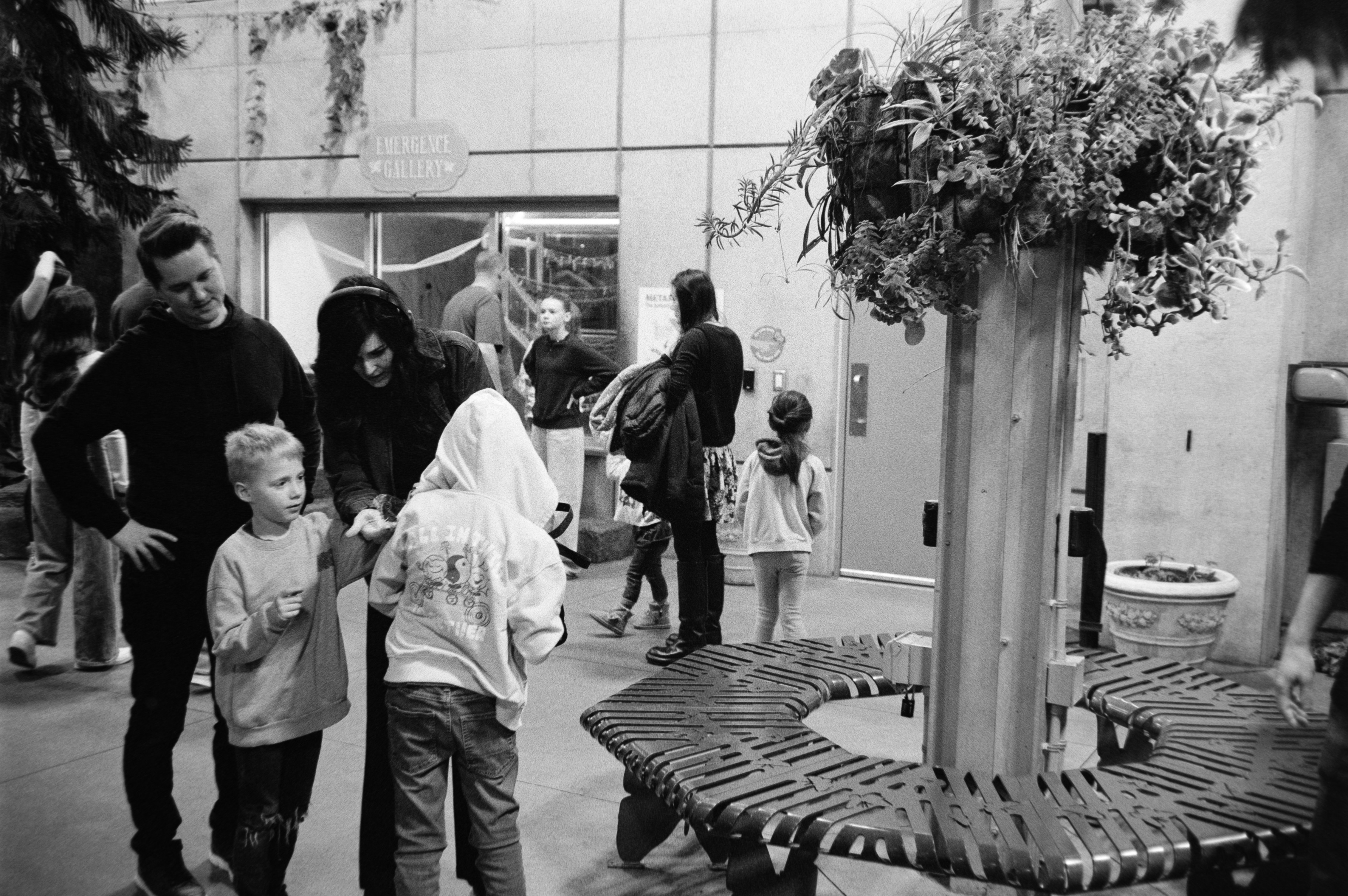 Gathered in Shared Space: Kids and Caregivers Around a Circular Plant Bed