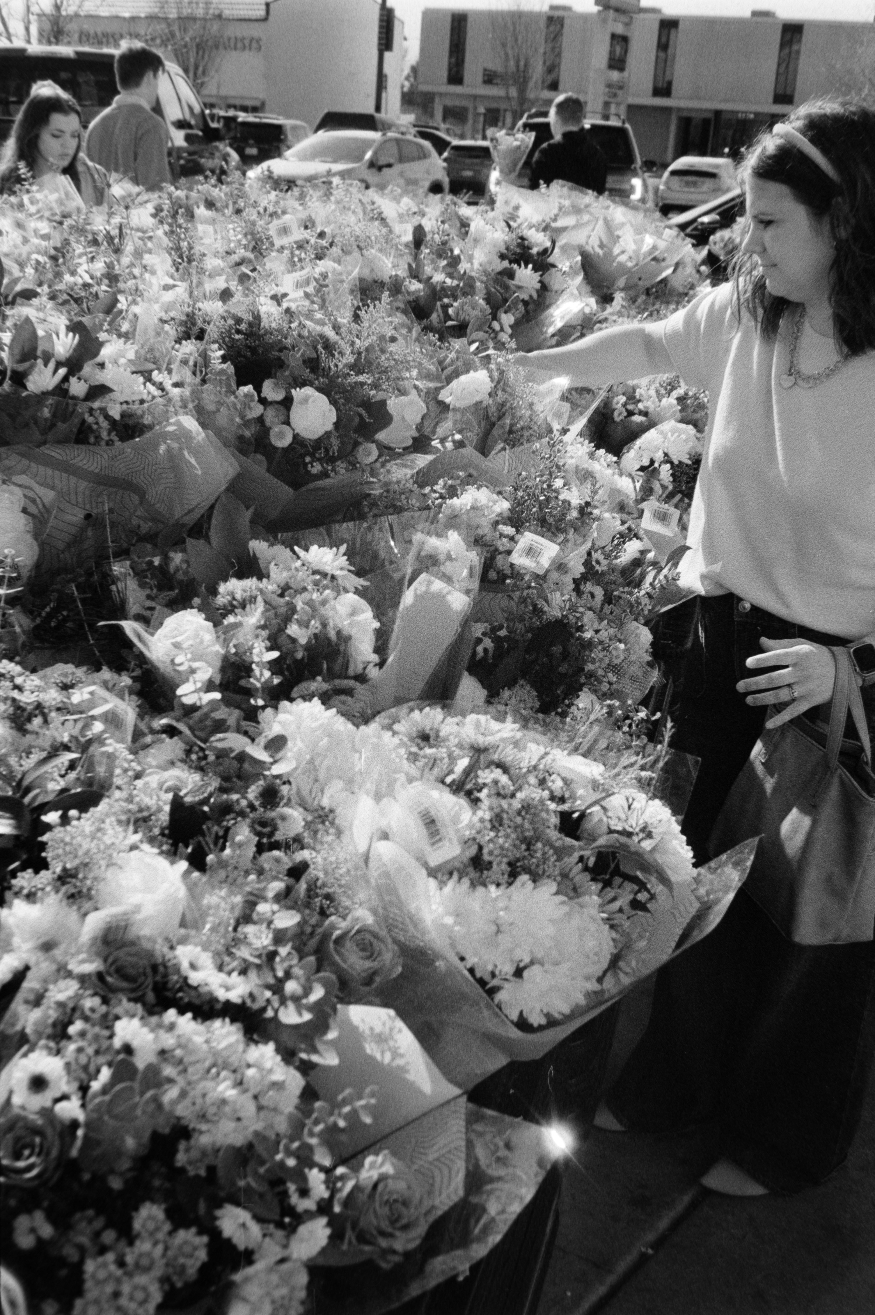Bouquets in Bloom: A Busy Market Moment