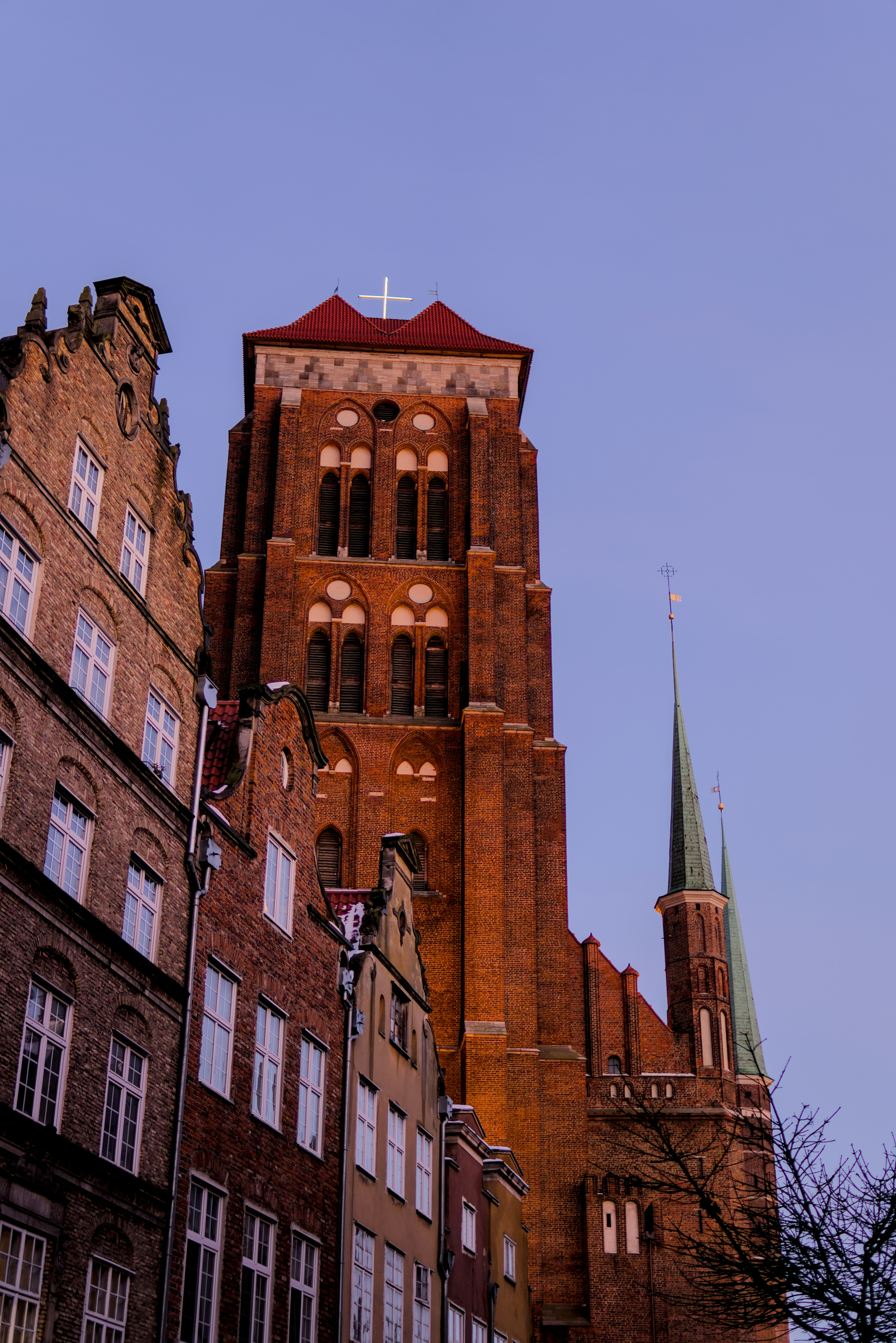 Brick Bell Tower Under a Clear Blue Sky