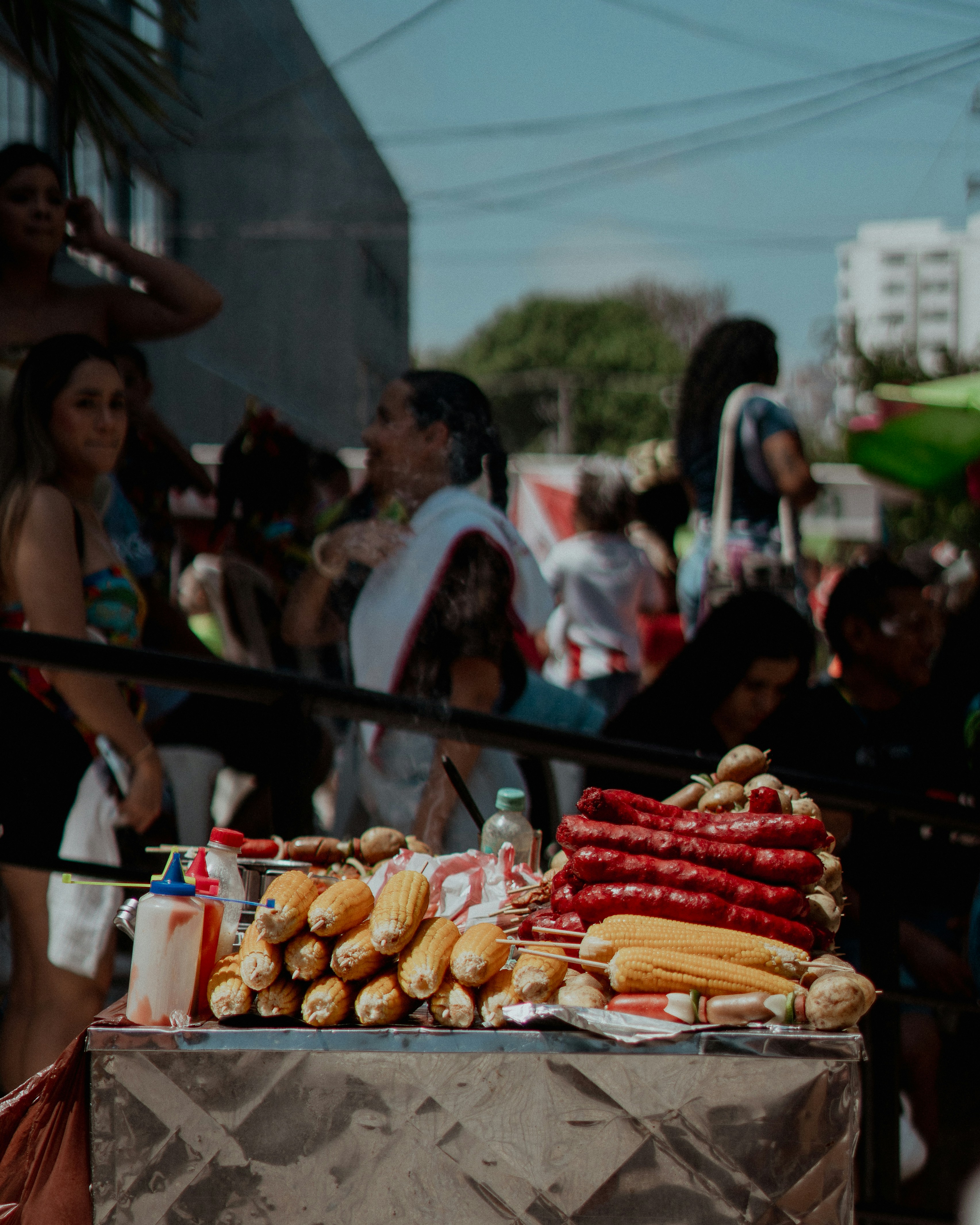 Street Food Stall Sunlit in a Busy Outdoor Market