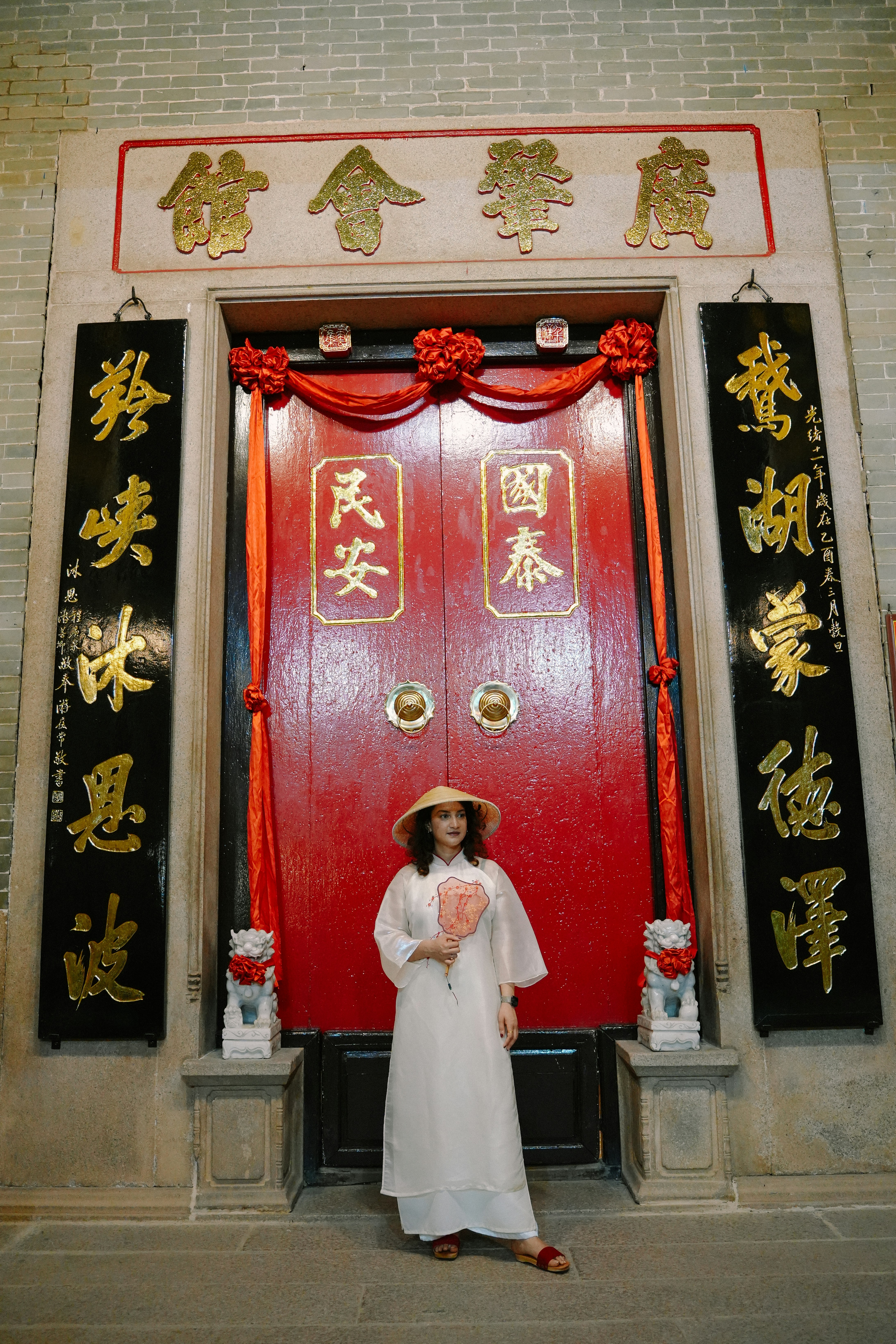 Red Gate Reverie: Woman in White at the Temple Door