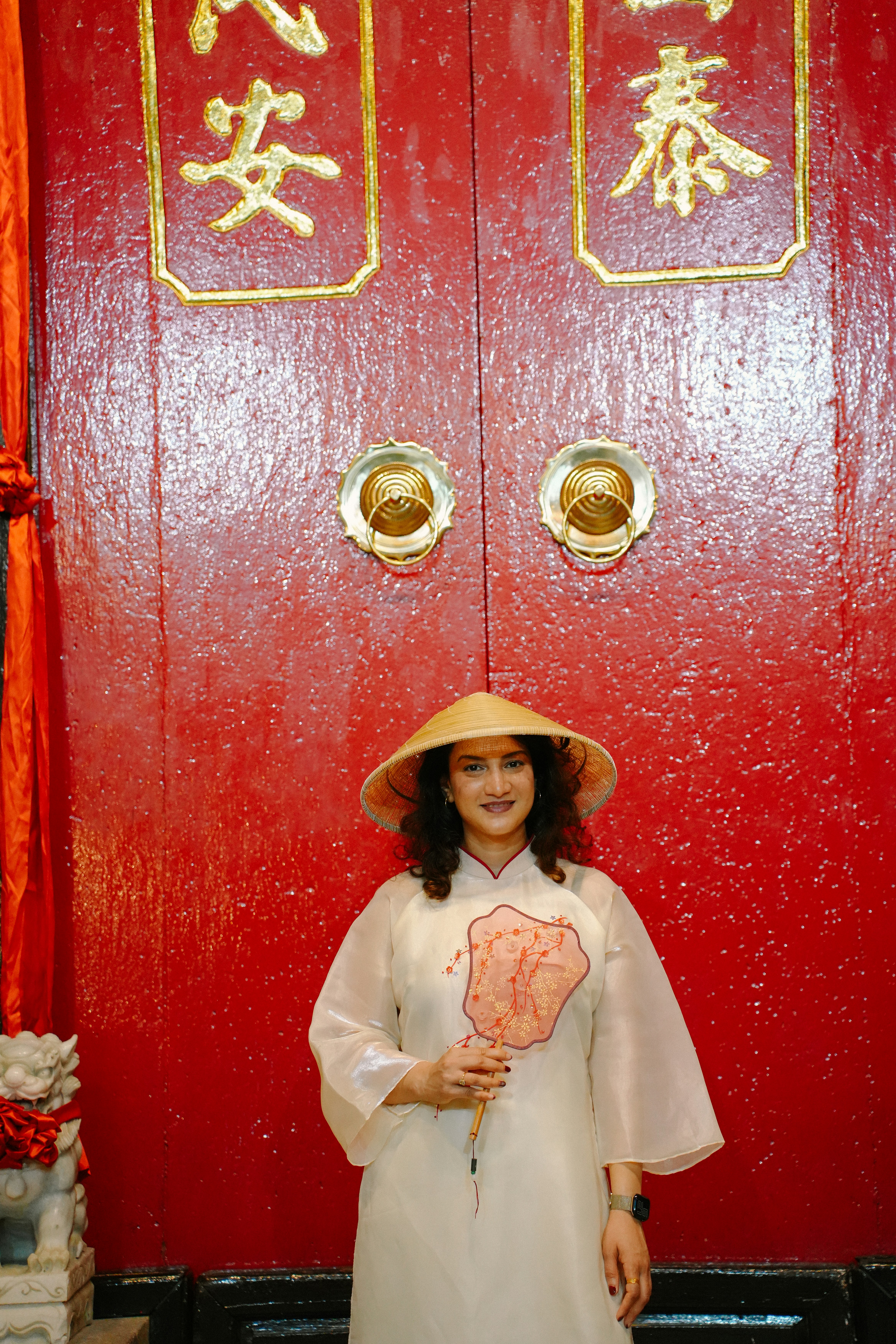Red Doors, Gentle Grace: A Vietnamese-Inspired Portrait in Front of Lunar Red