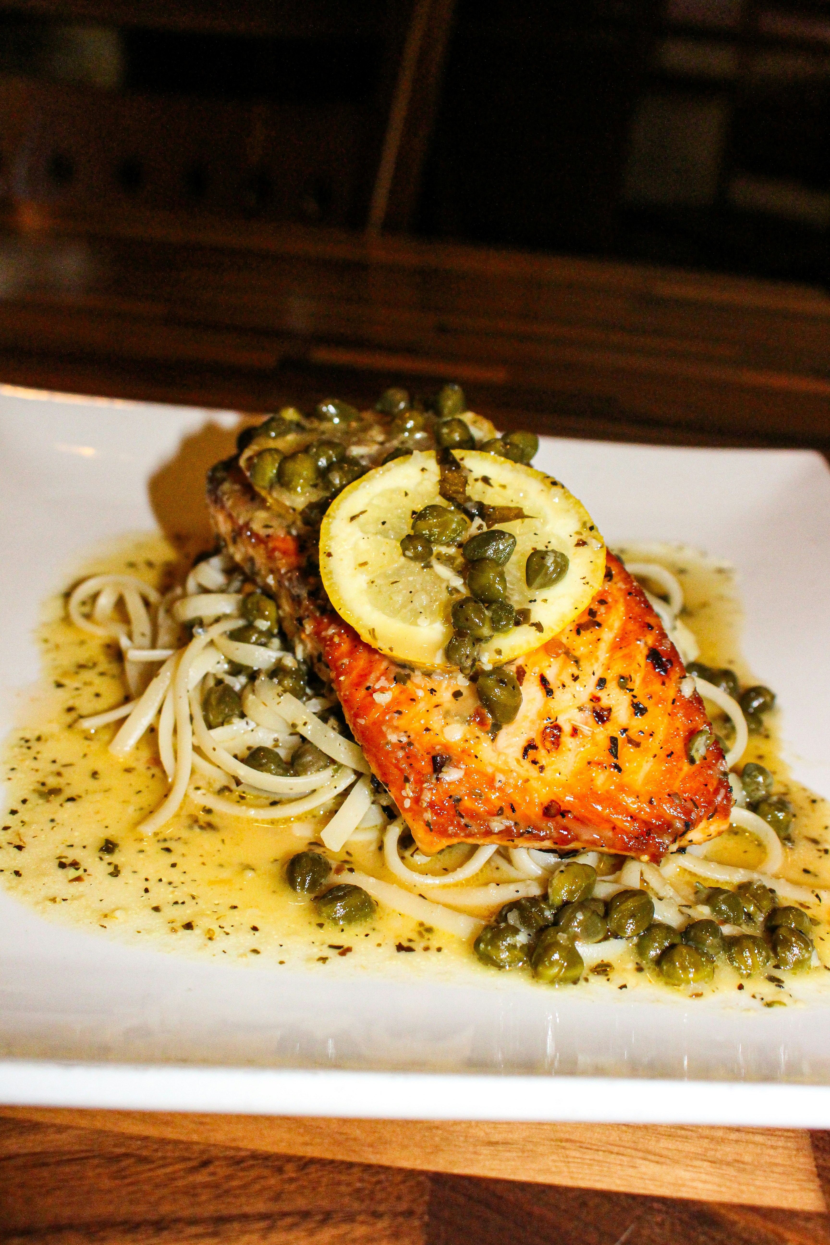 Lemon-dressed Salmon on a Bed of Capellini with Caper Sauce