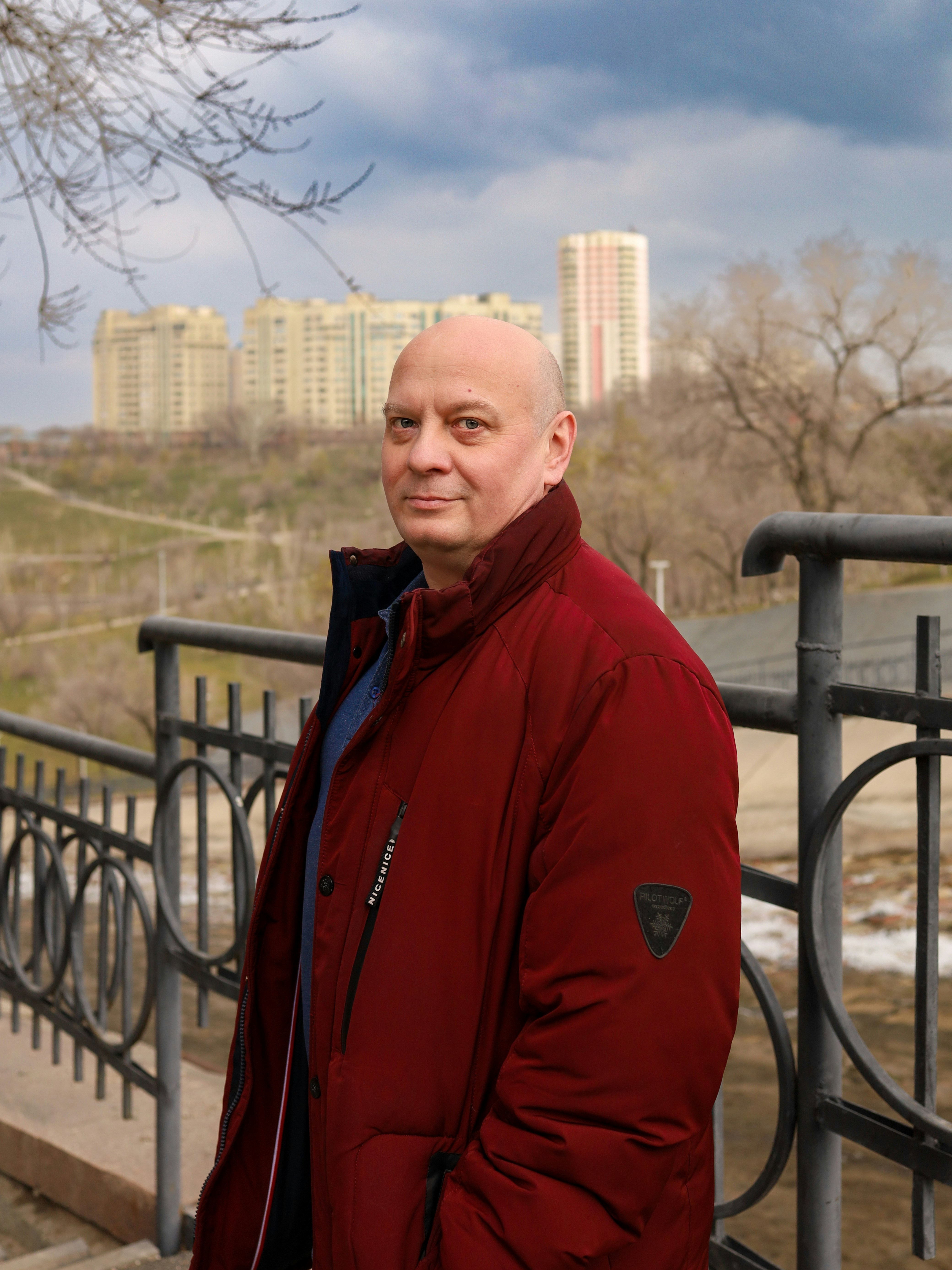 Balanced Portrait on Riverside Promenade