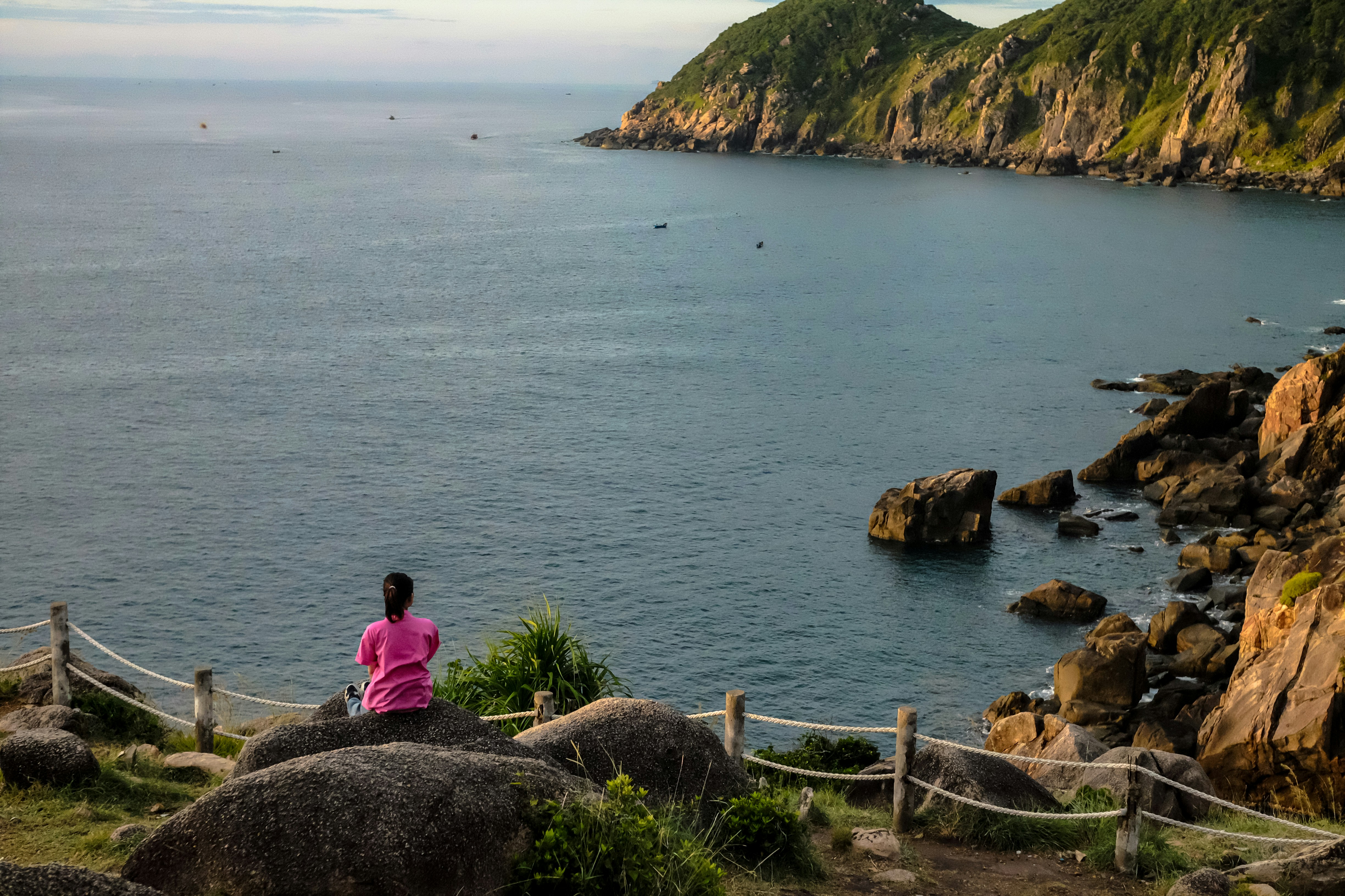 Cliffside Pause: A Secluded Moment Above the Sea