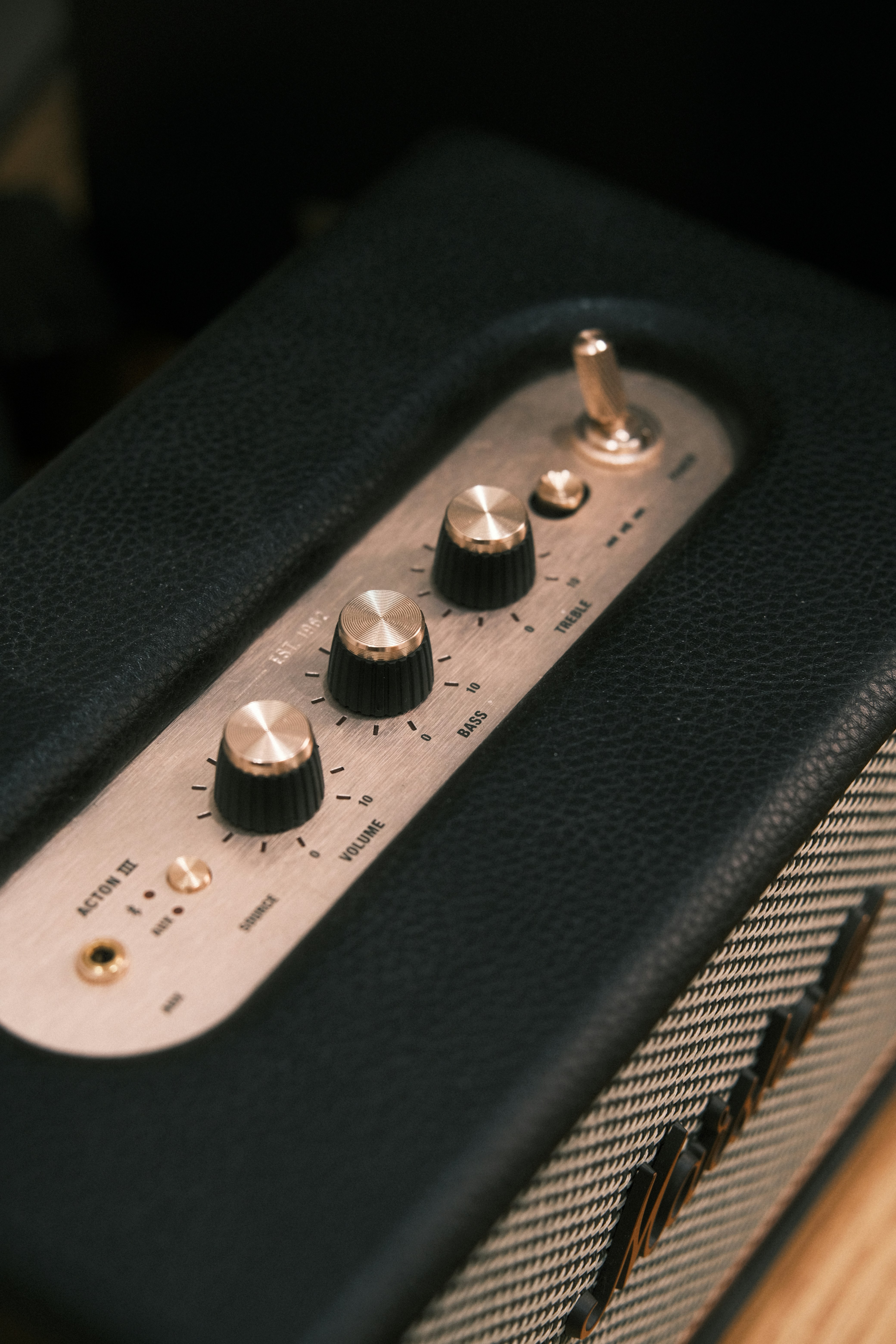 Vintage Warmth: Close-Up on a Guitar Amplifier's Control Panel