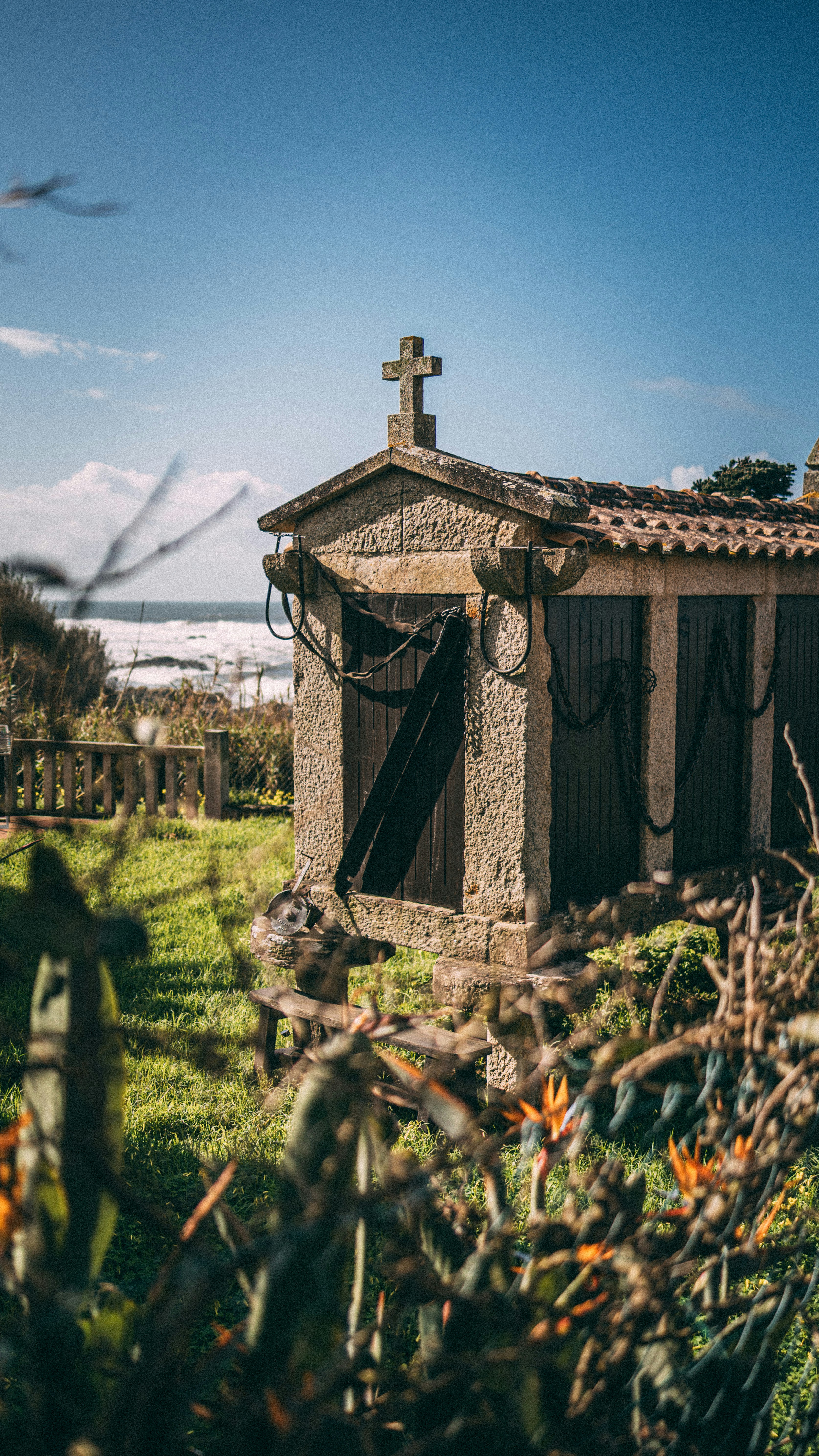 Chapel by the Sea: Weathered Stone and Salt-Tailed Light