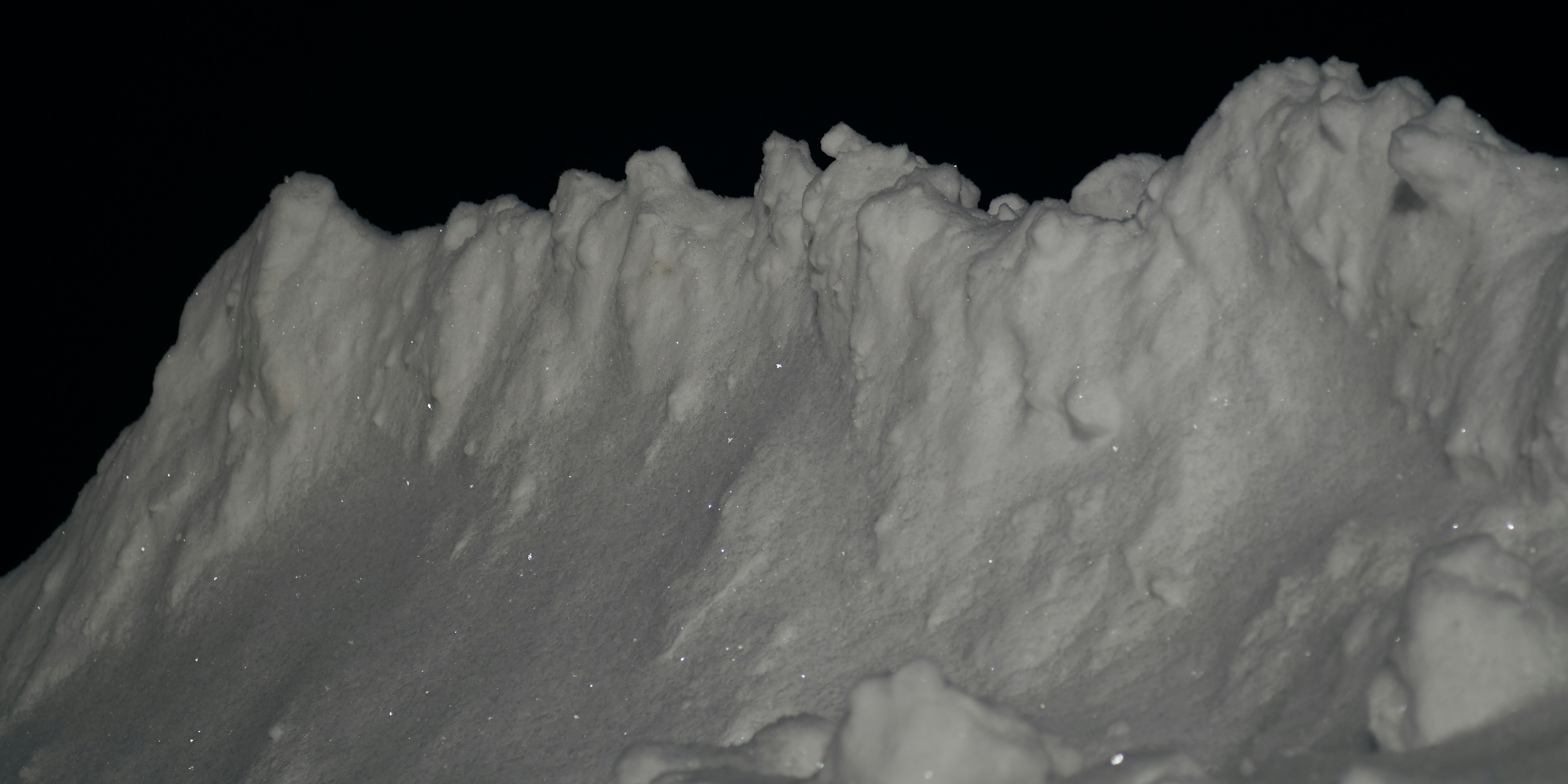 Snow Ramp at Night: A Moonlit Ridge of Fresh Snow