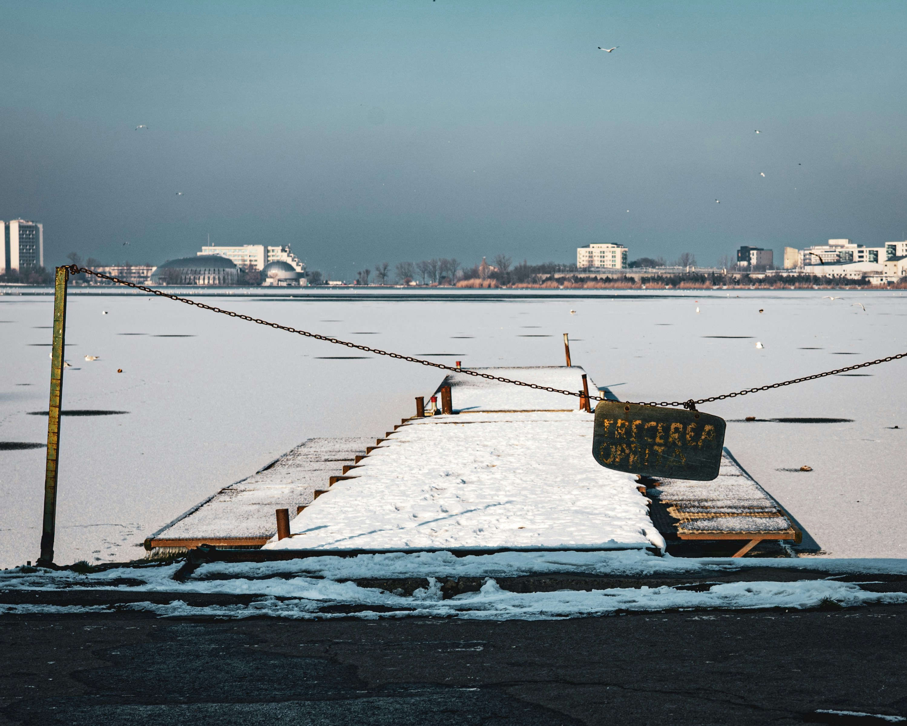 Frozen Pier Into a Wakeful City