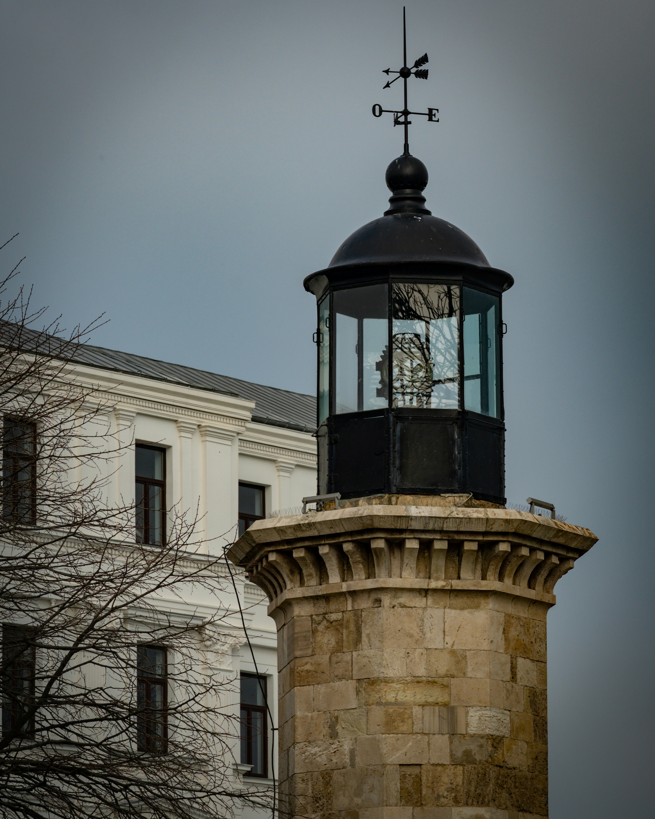 Lighthouse Lantern Beneath a Quiet Sky
