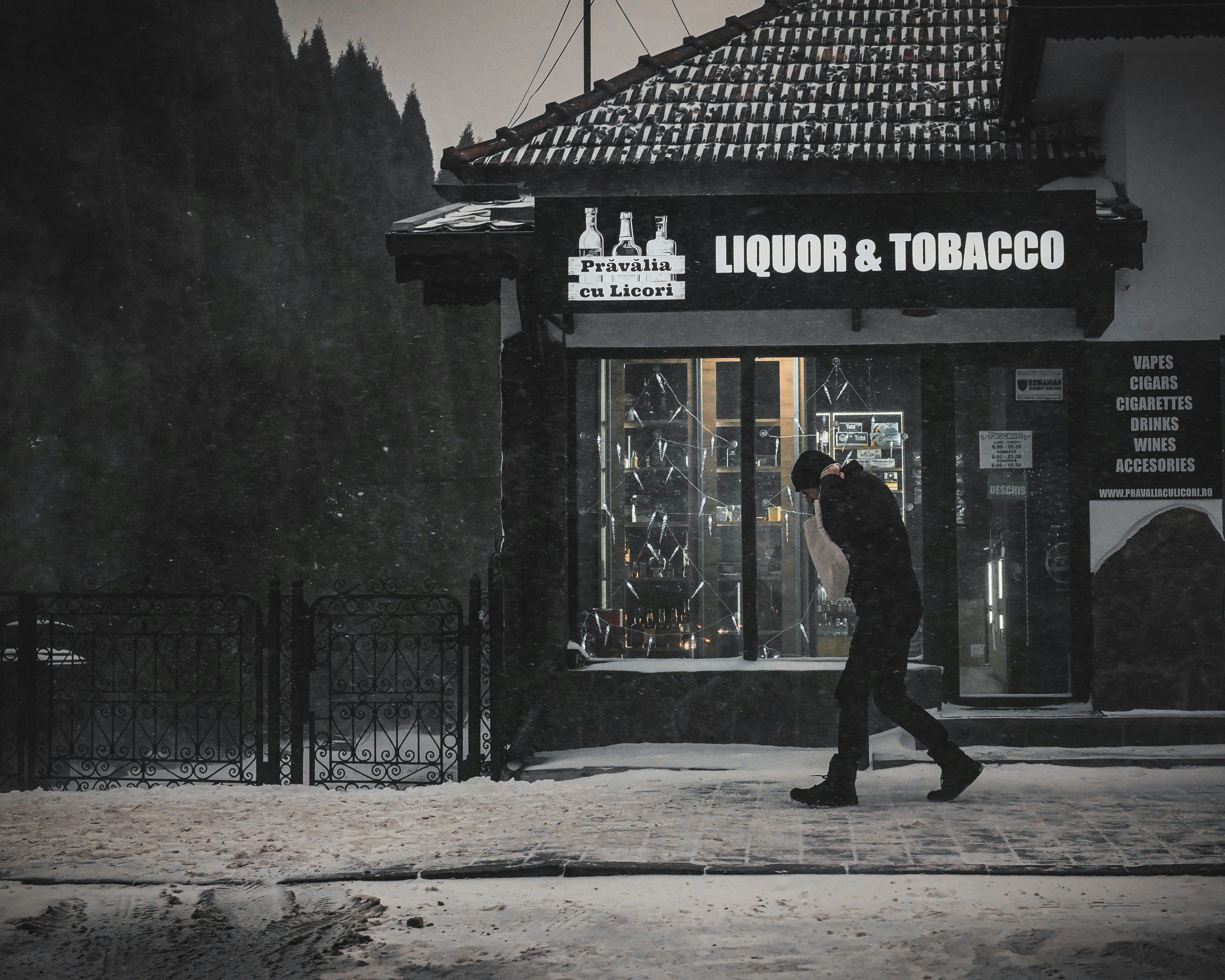 Quiet Stride Past the Liquor Shop in Winter Light
