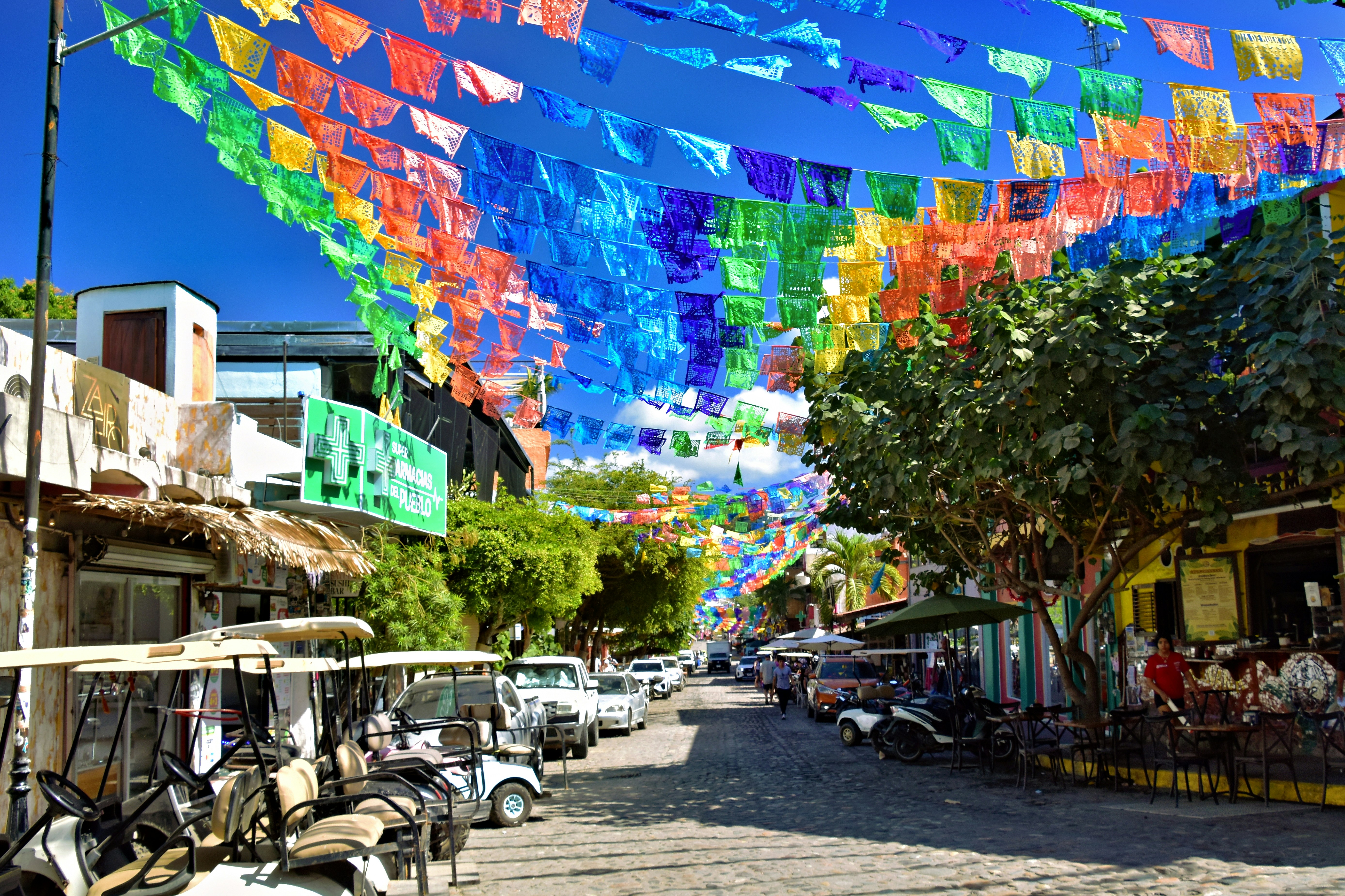 Colorful Bazaar Boulevard Beneath a Sky of Flags