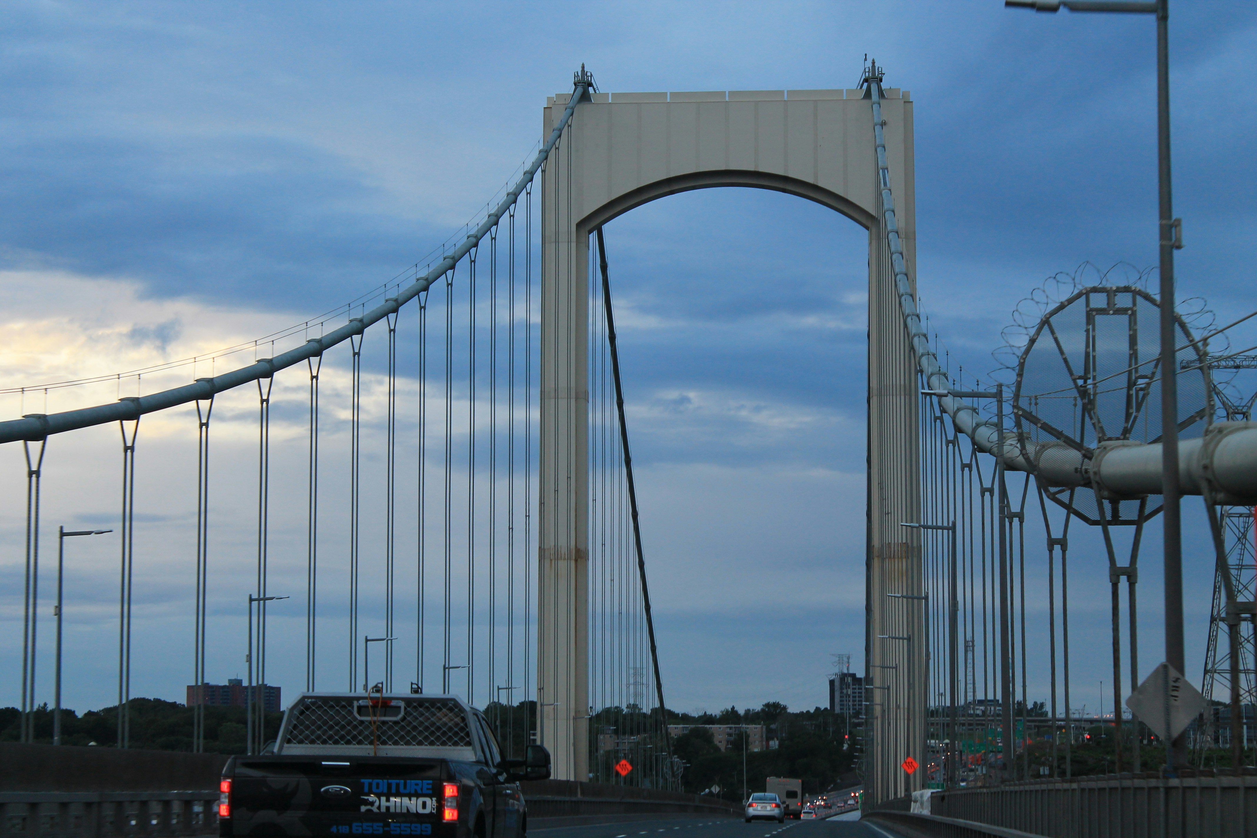 Crossing the Arc: a City Bridge under a Wide Sky