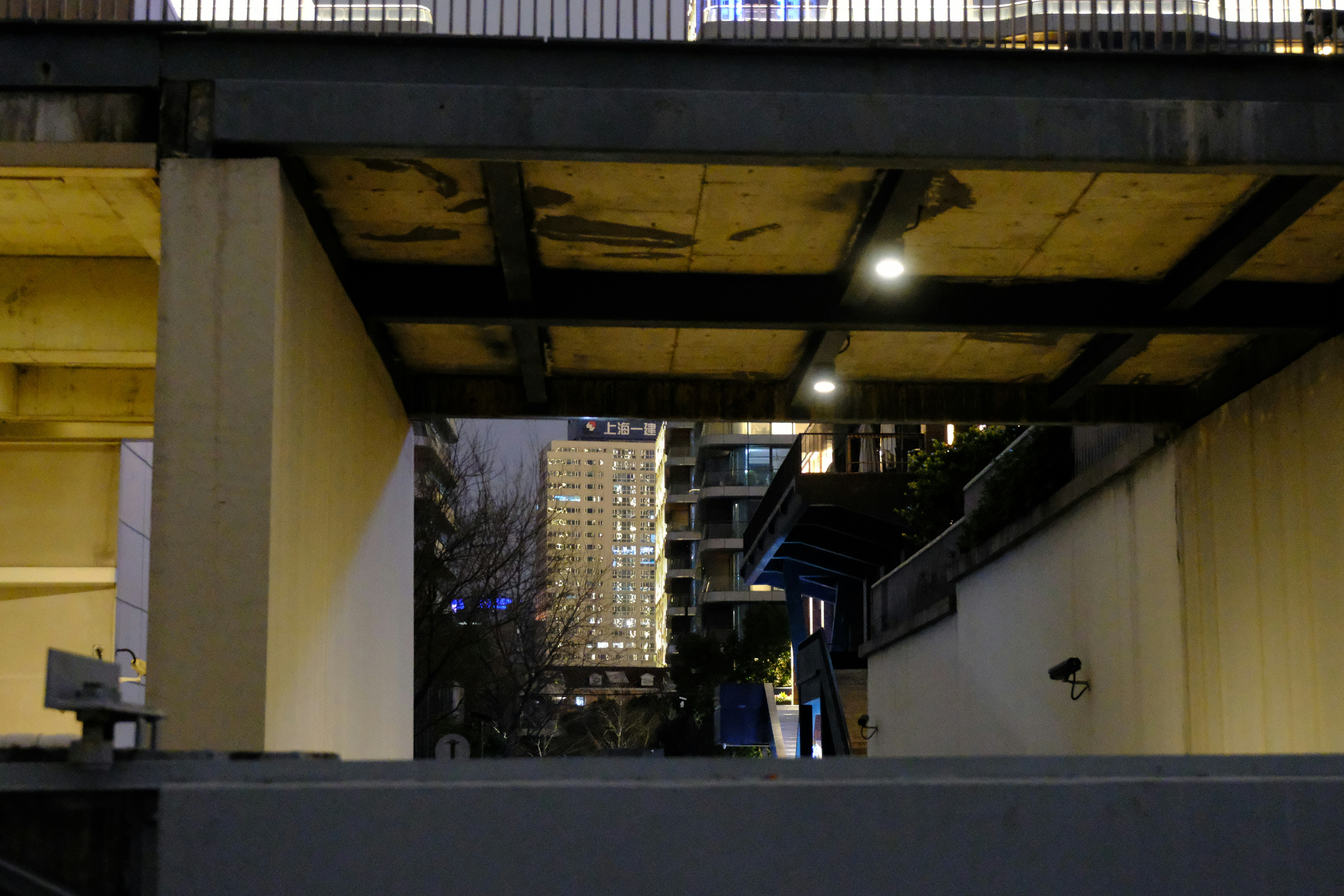 Underpass Glow: City Lights Framing a Quiet Corridor