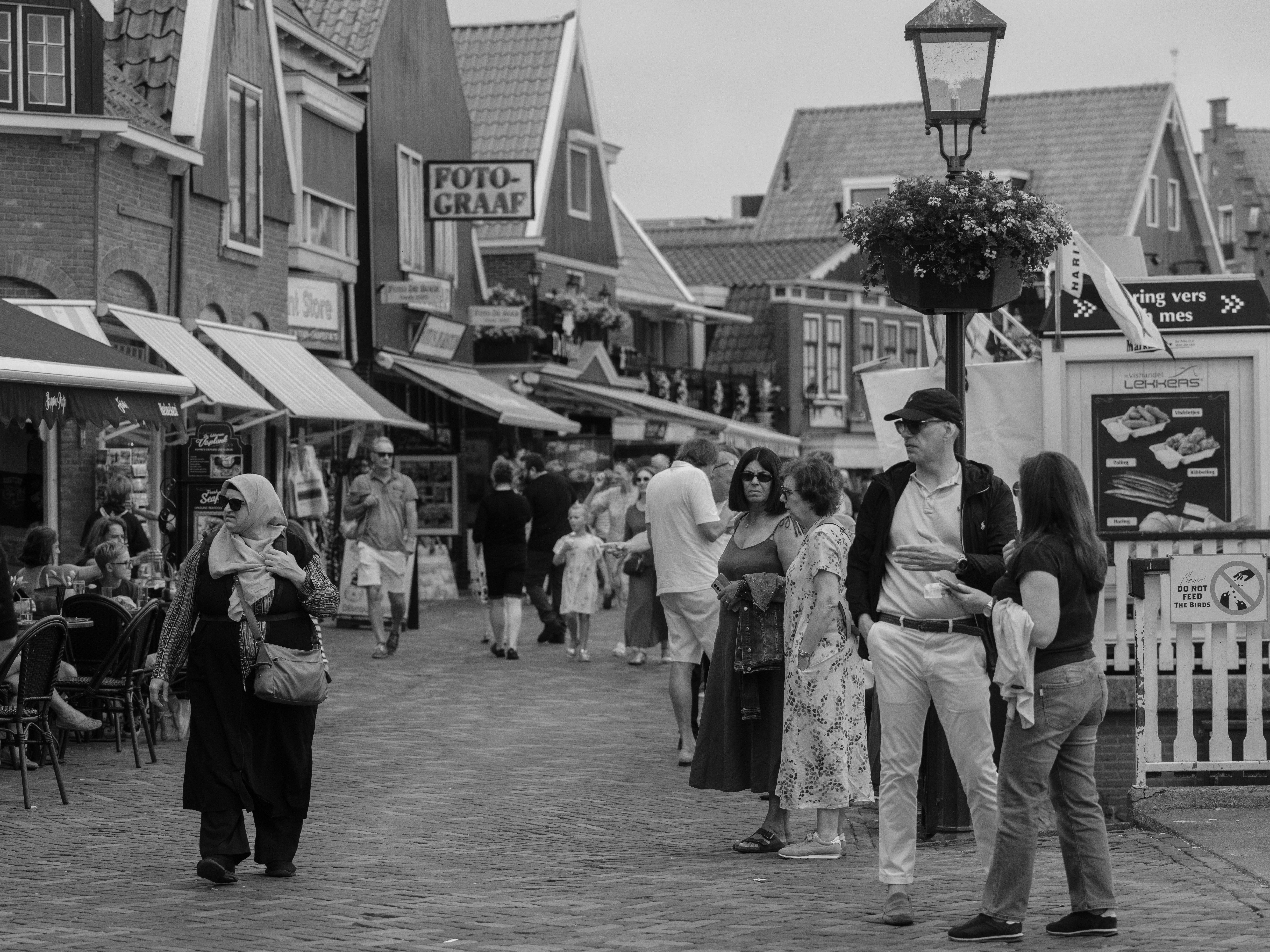 Cobbled Street Gallery: Faces, Signs, and Courtyard Cafés