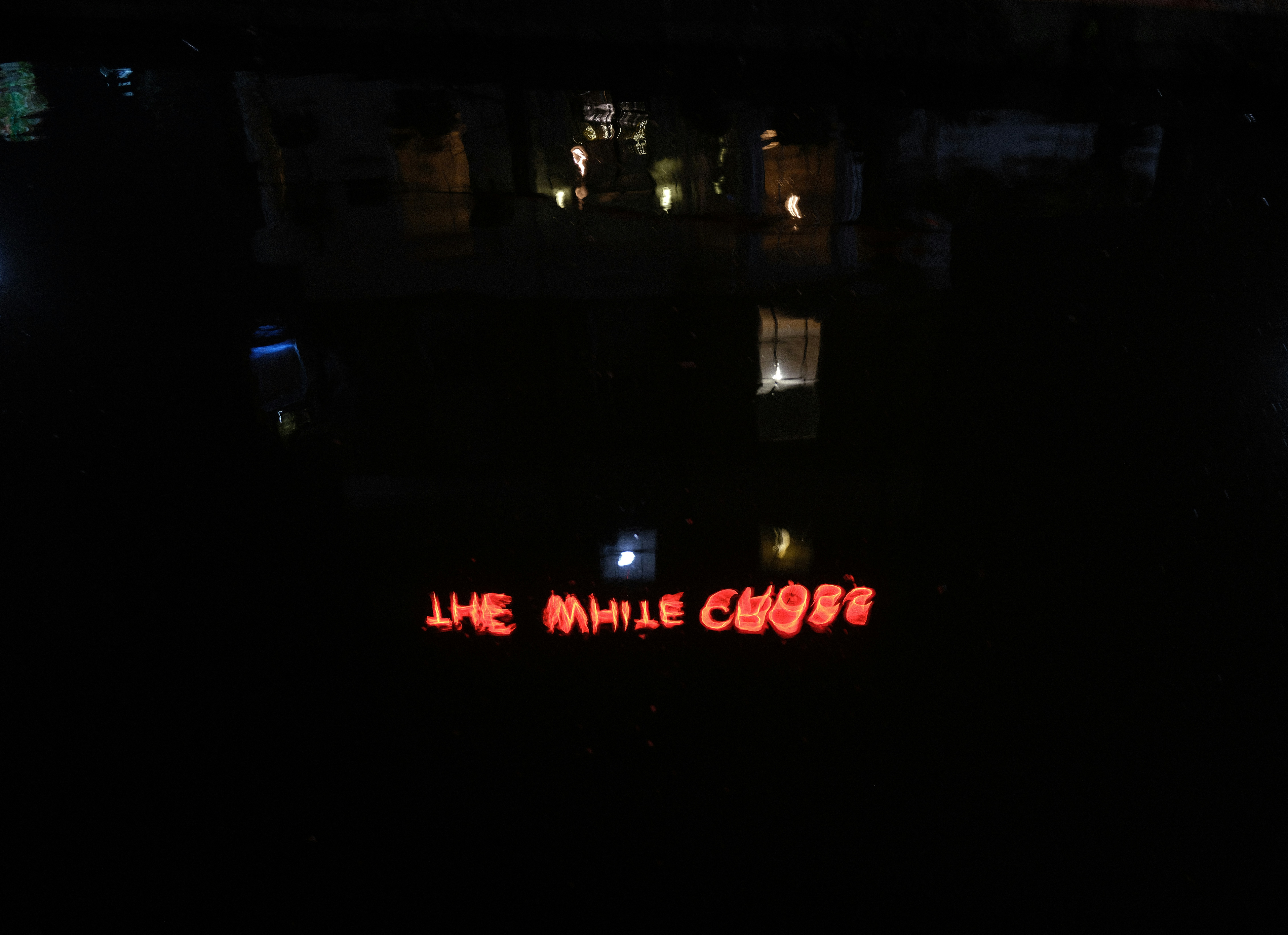 Glowing Neon Echo on Silent Water