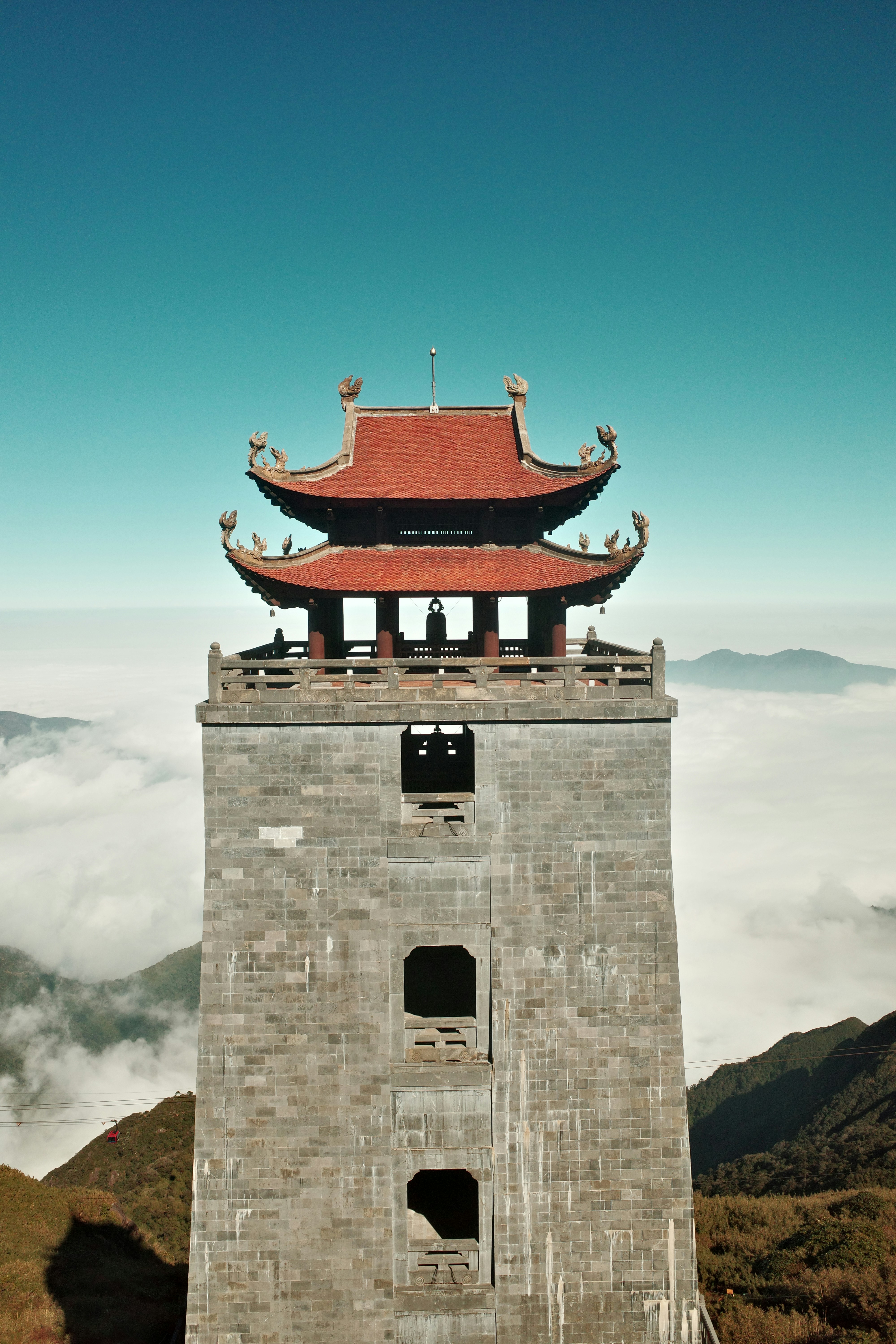 Pagoda on a Mountain Spire Rising Above the Clouds