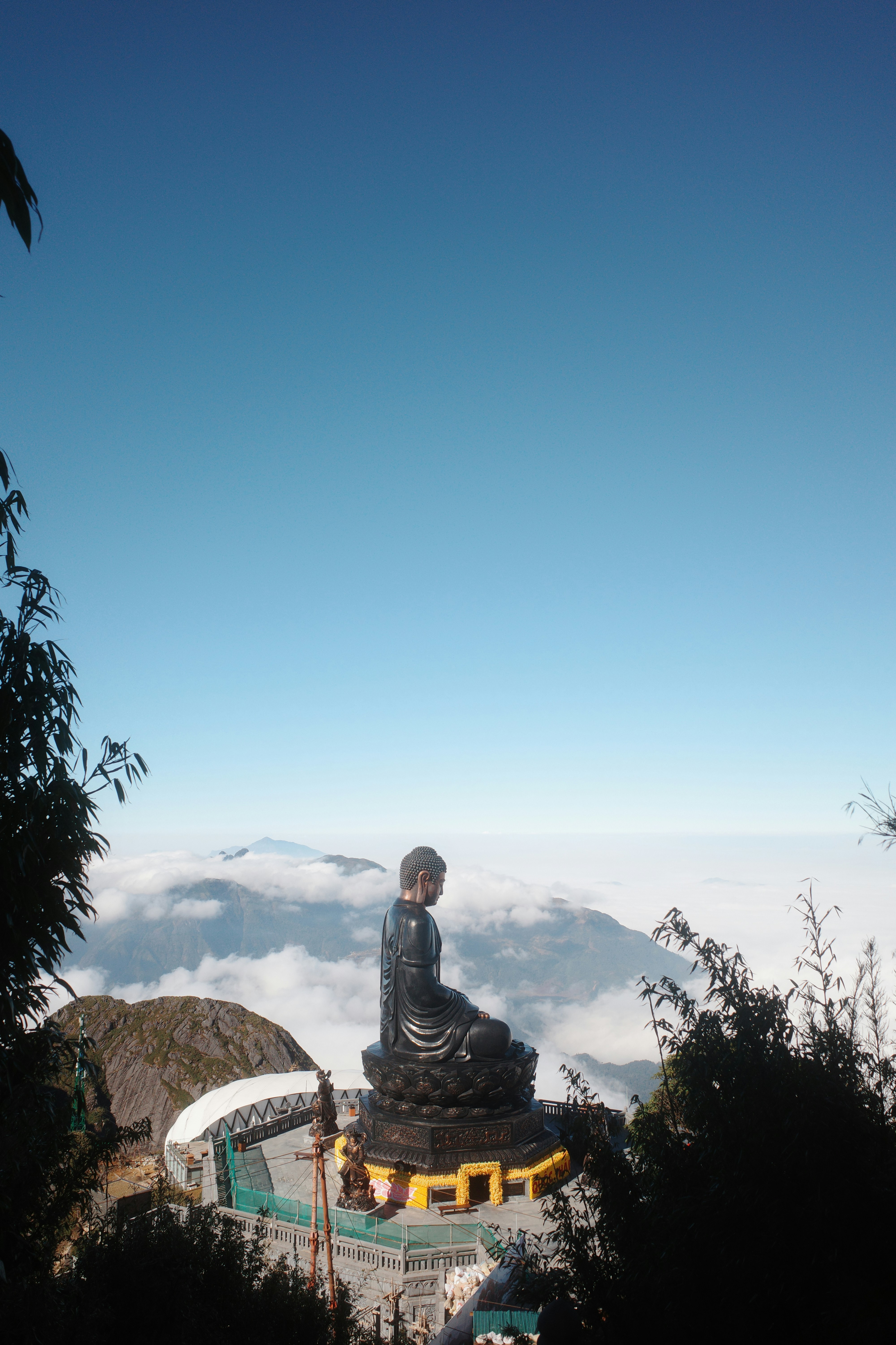 Cloud-Cilded Summit: The Meditative Buddha Overlook