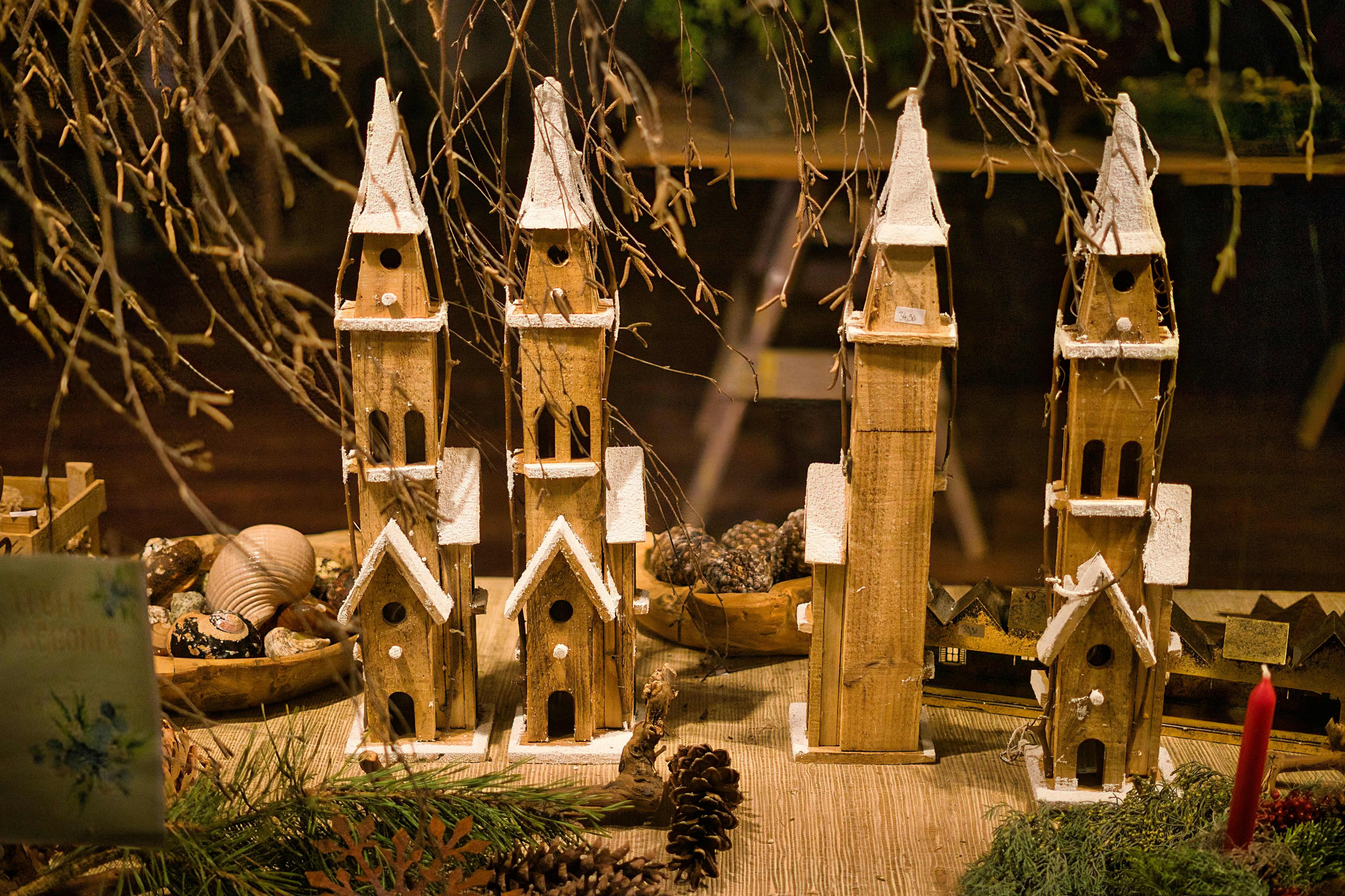 Whimsical Village of Wooden Spires under Winter Girders