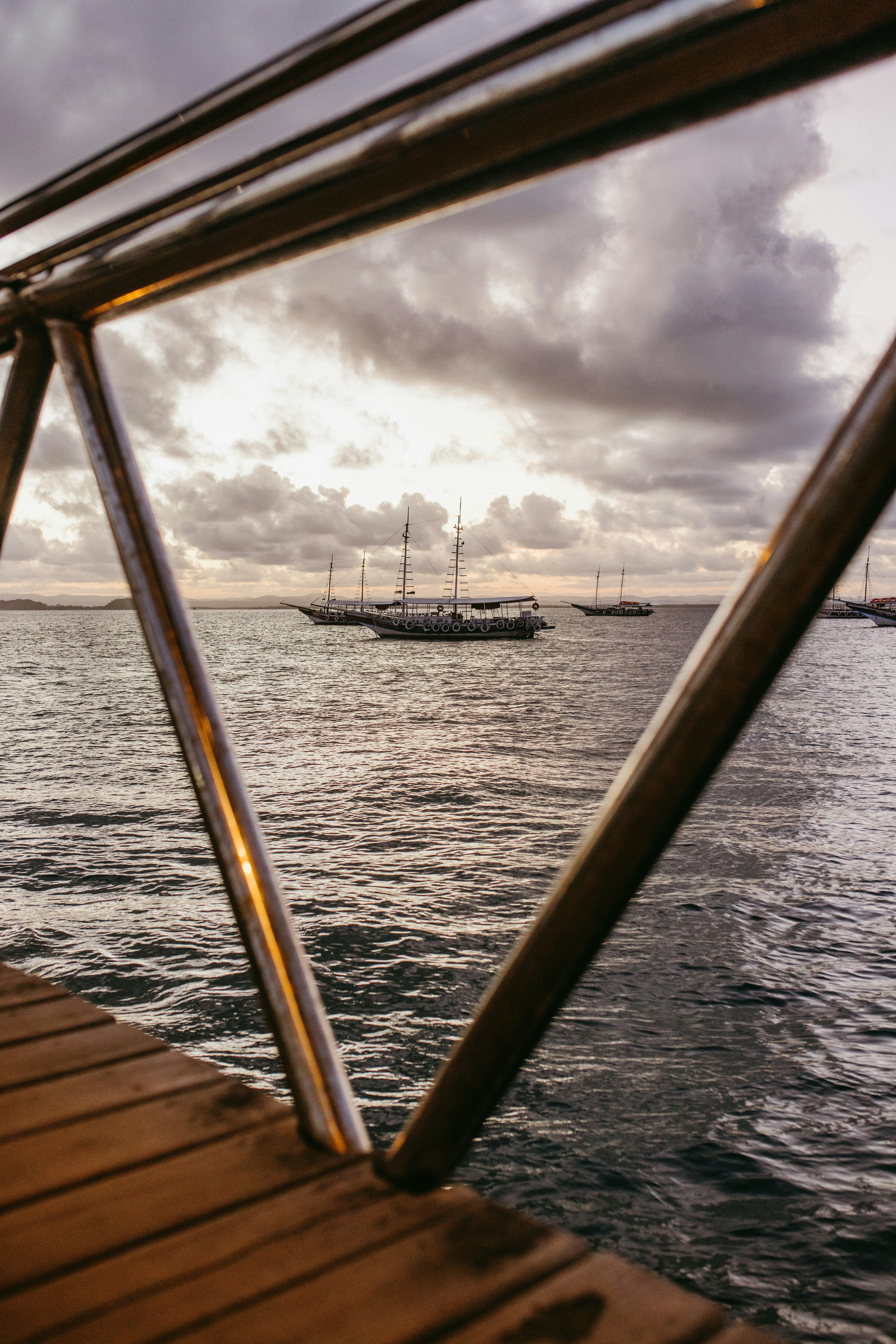 Horizon Through the Frame: Boats Resting in Quiet Waters