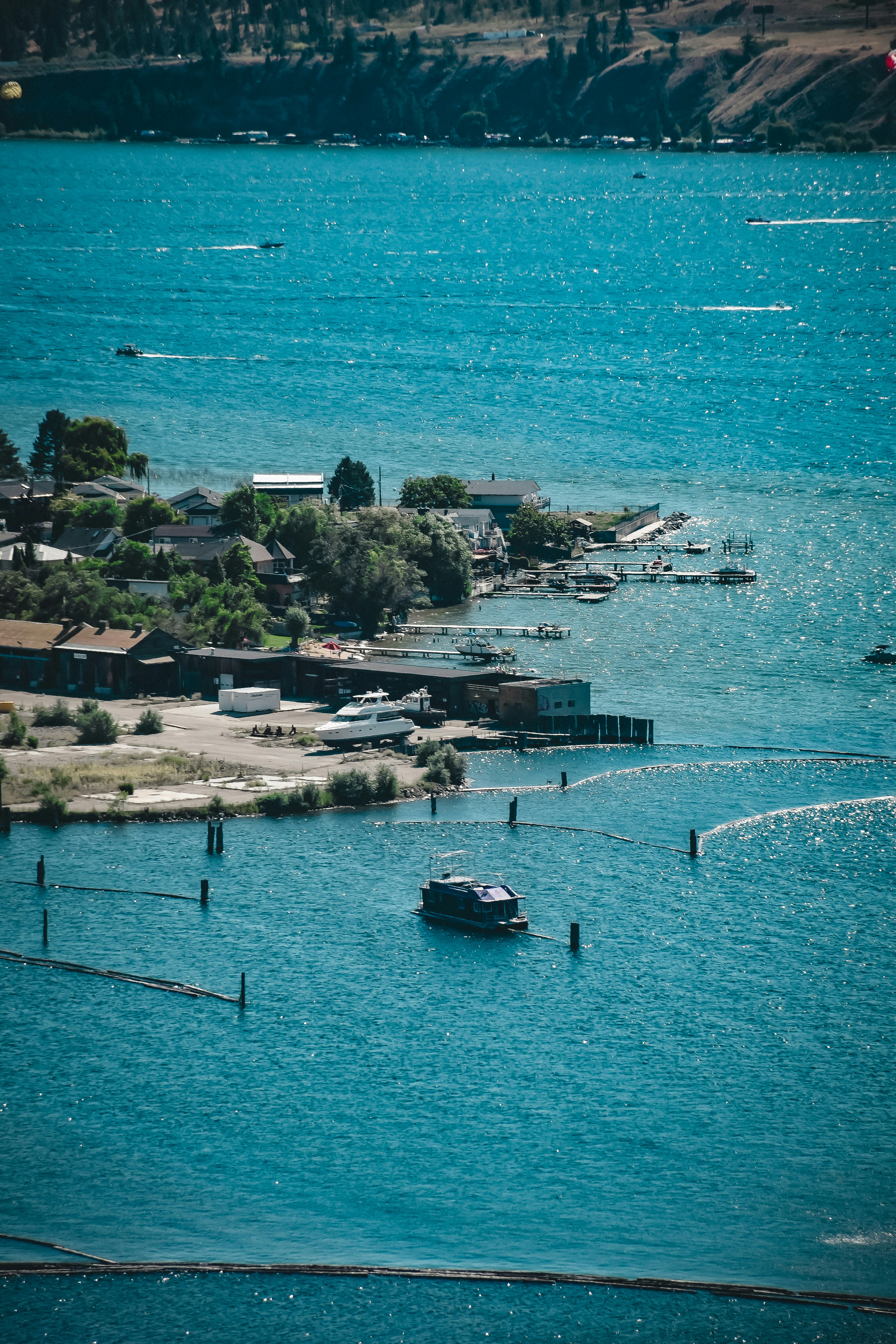 Azure Harbor village: boats, docks, and turquoise water