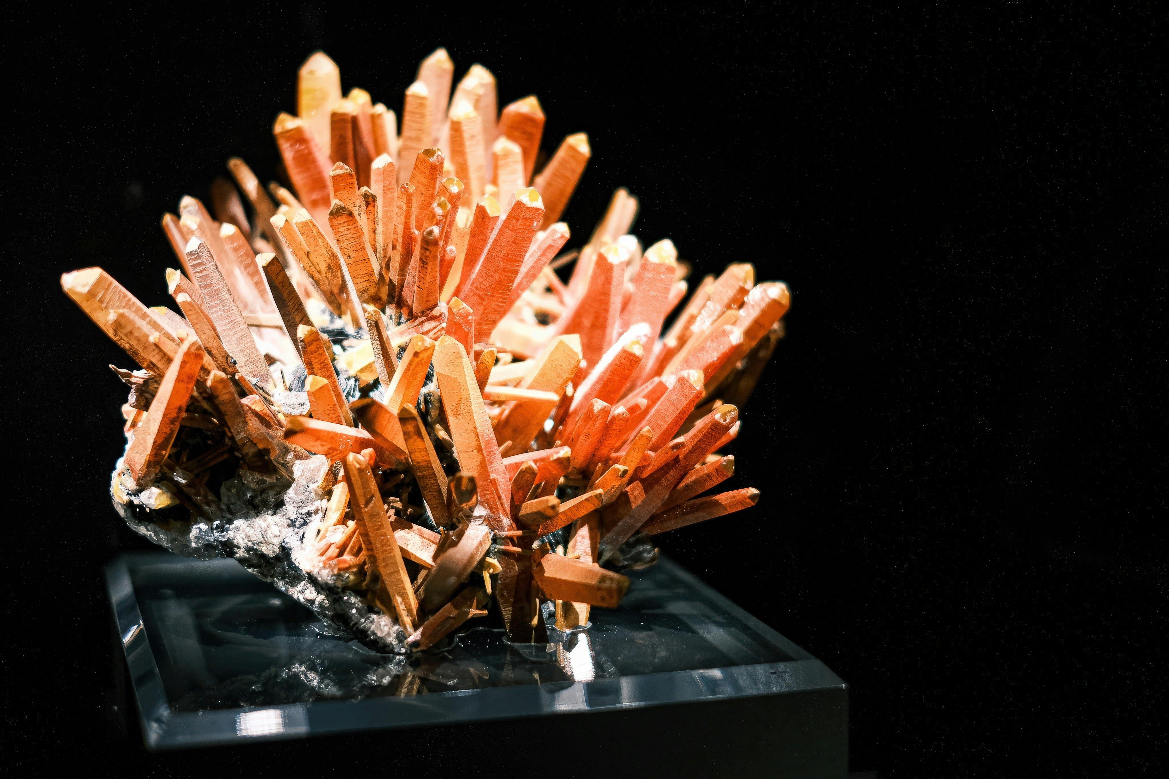Crimson Crystal Bouquet: Orange Quartz Bloom on Glass Base