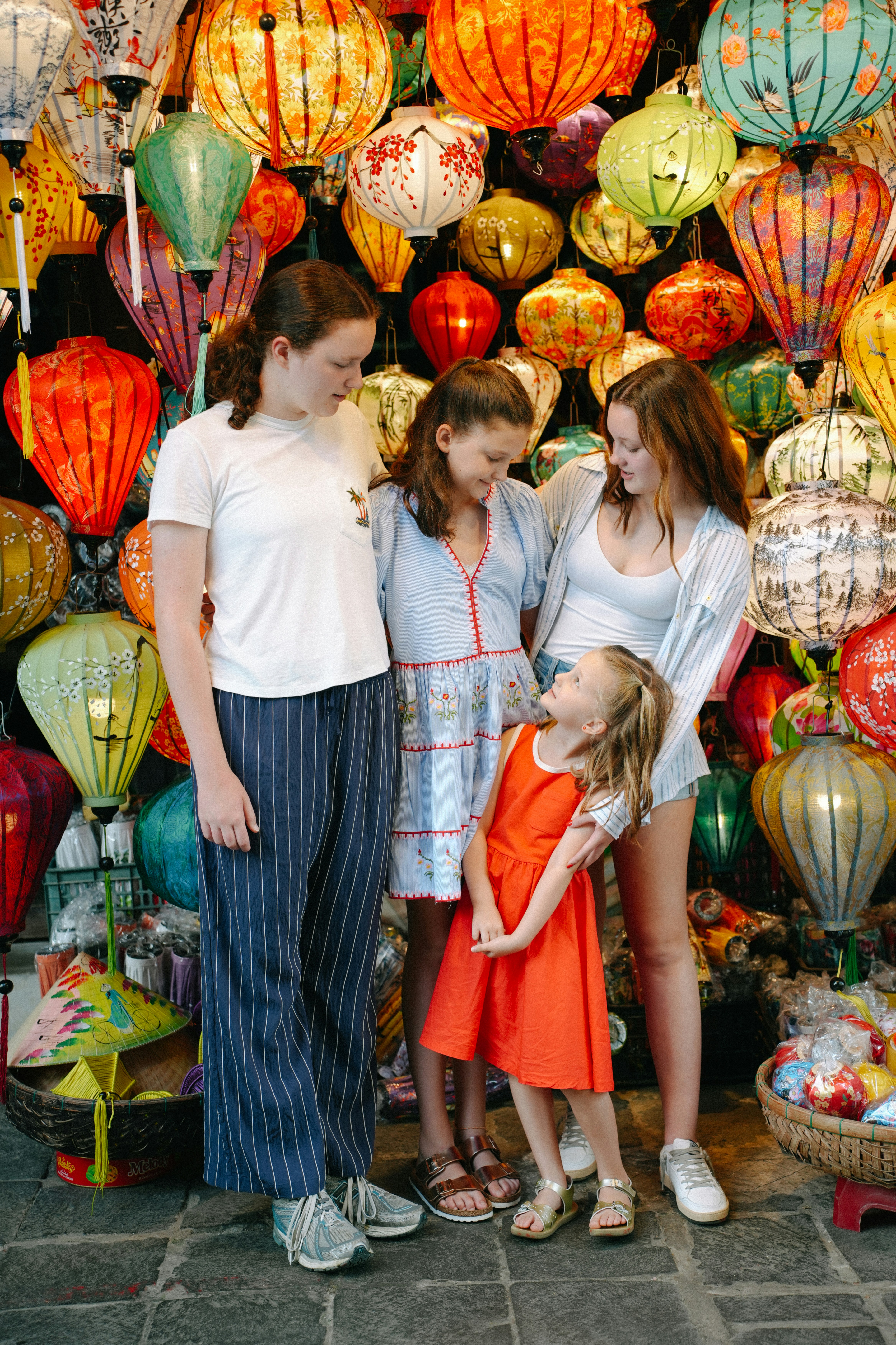 Lanterns & Laughter: A Portrait Among Floating Lights