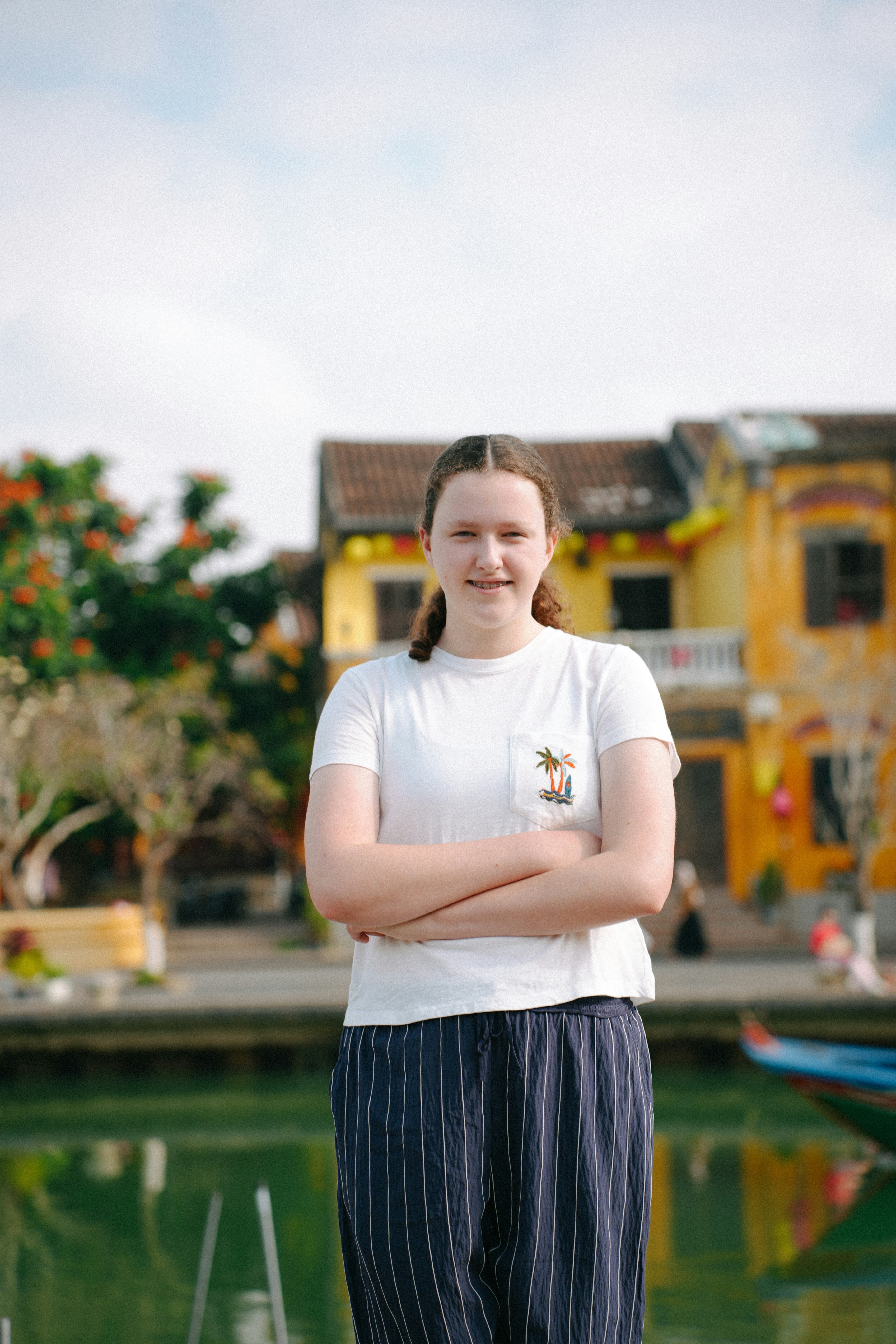Confident Portrait in a Colorful Coastal Town