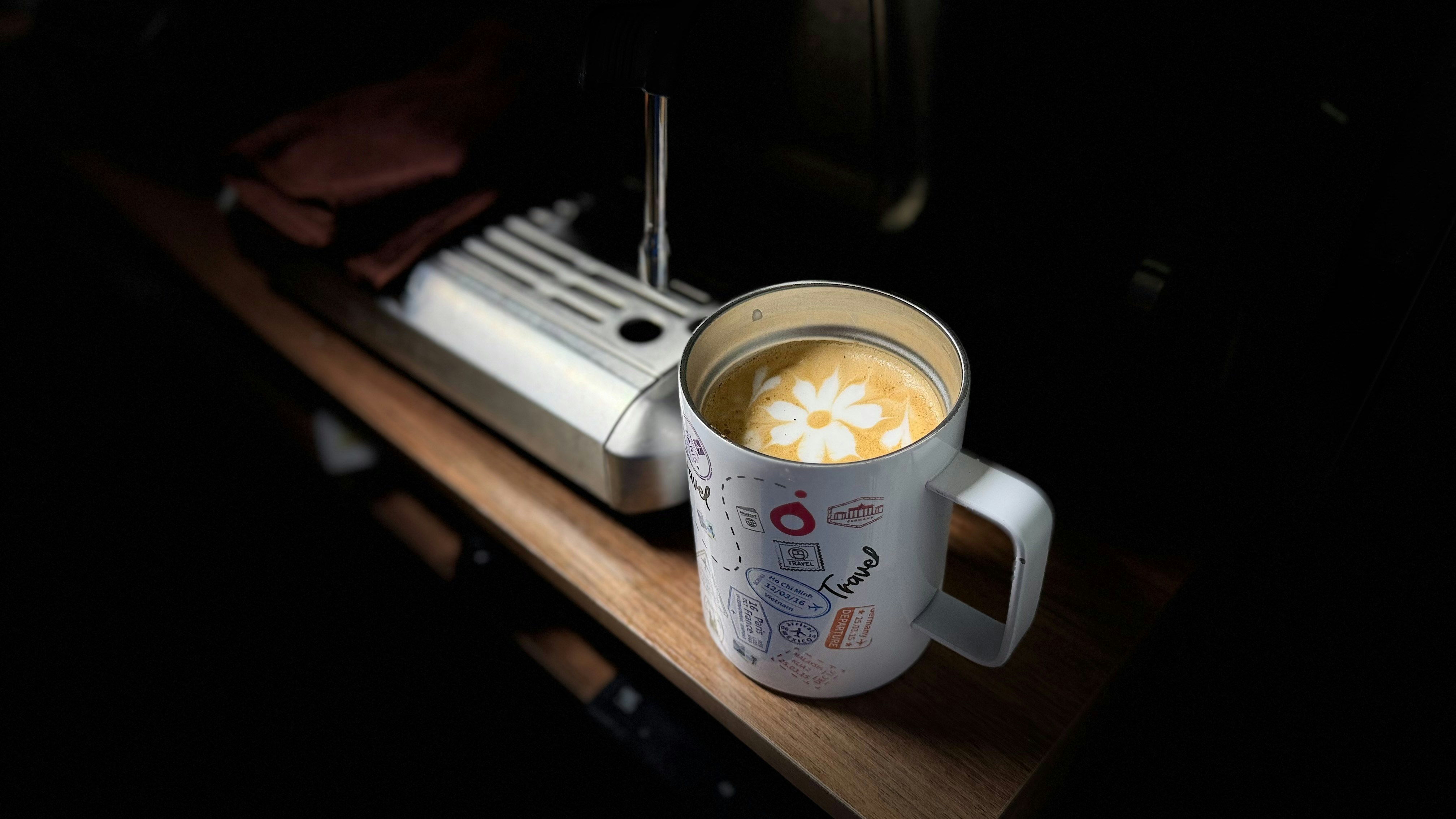Latte Art in a Quiet Studio: A Coffee Mug Under Spotlight